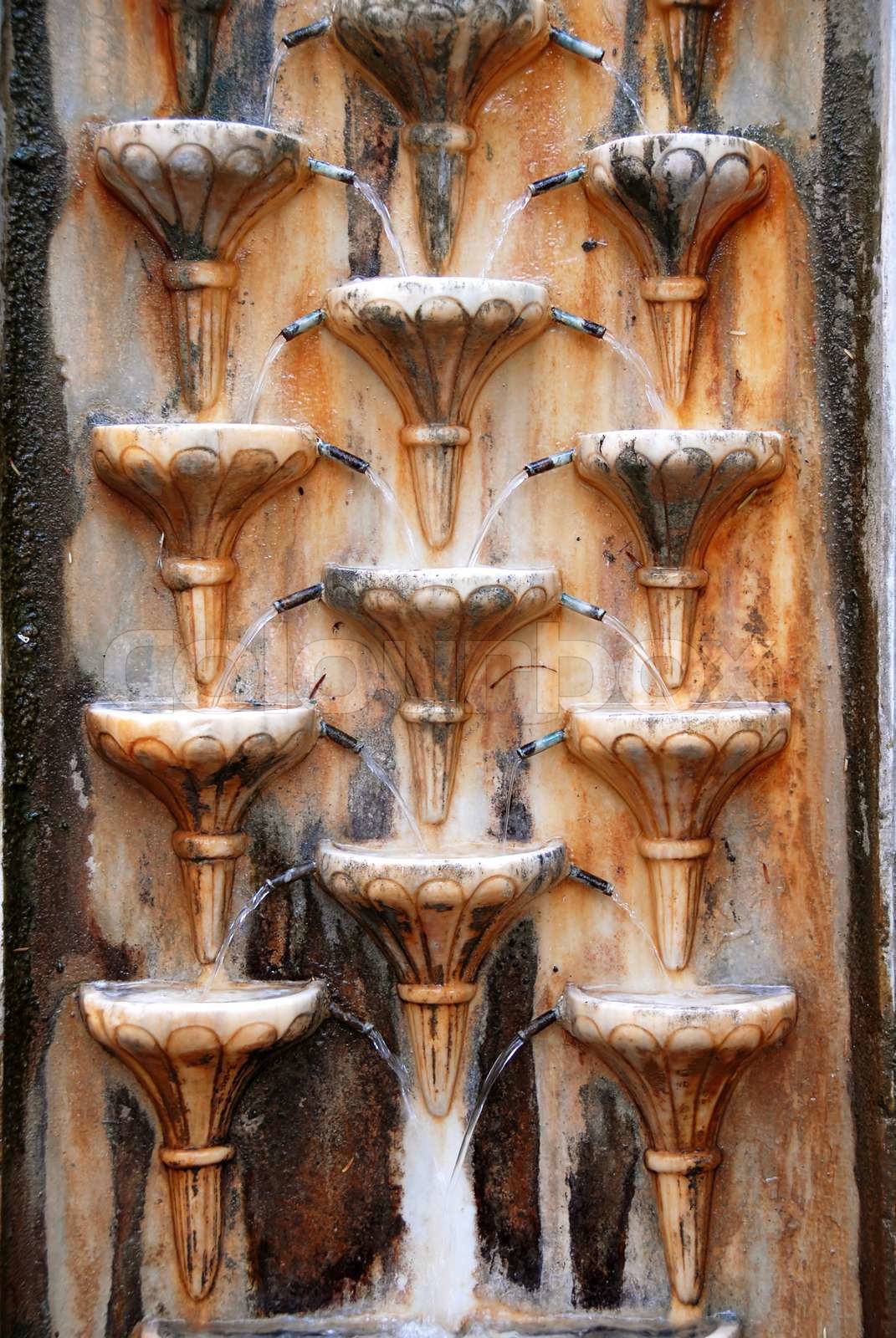 old stone wall rusty fountain texture outdoor | Stock image | Colourbox