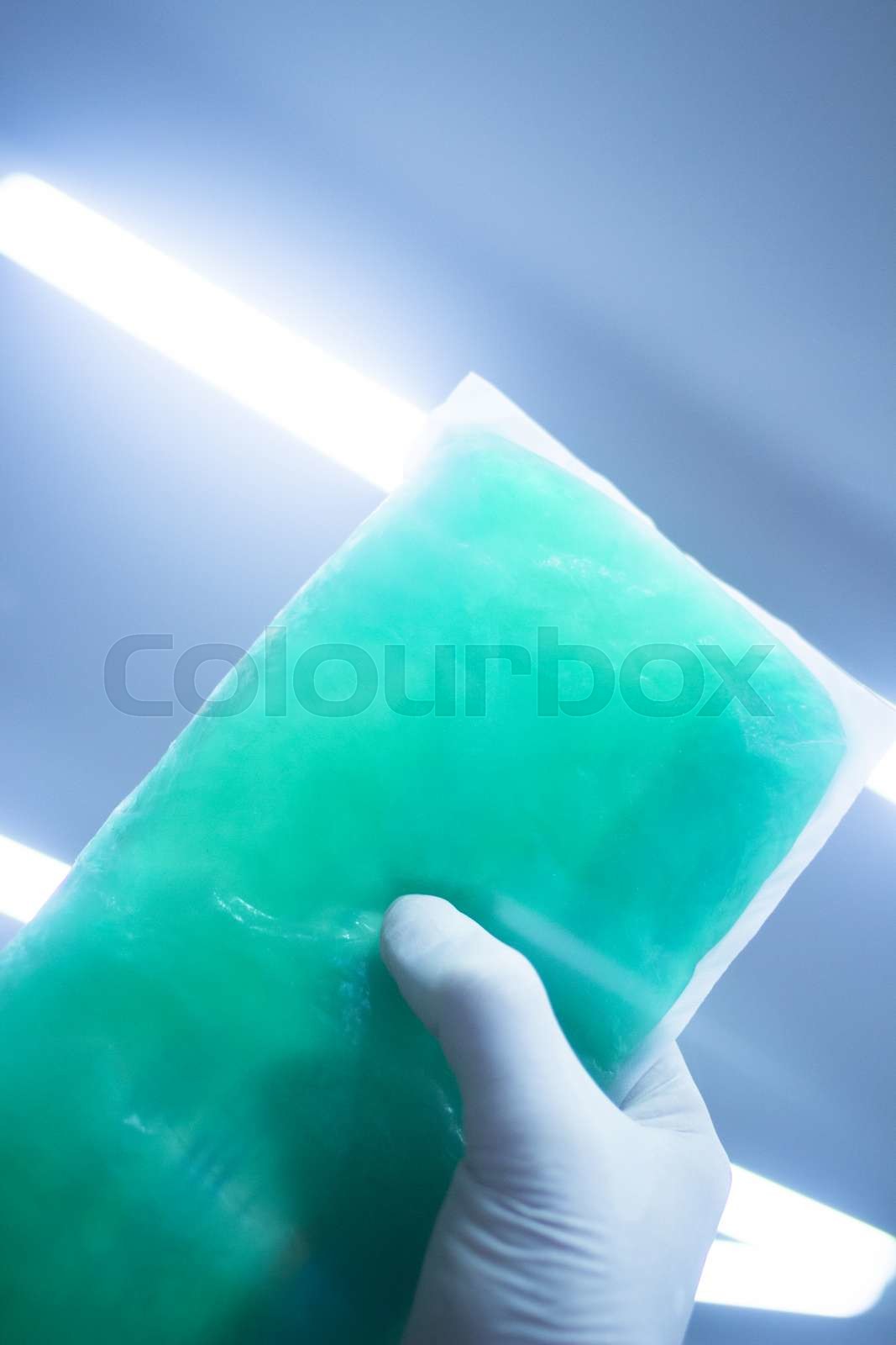 Green physiotherapy cold muscle injury gel pack | Stock image | Colourbox