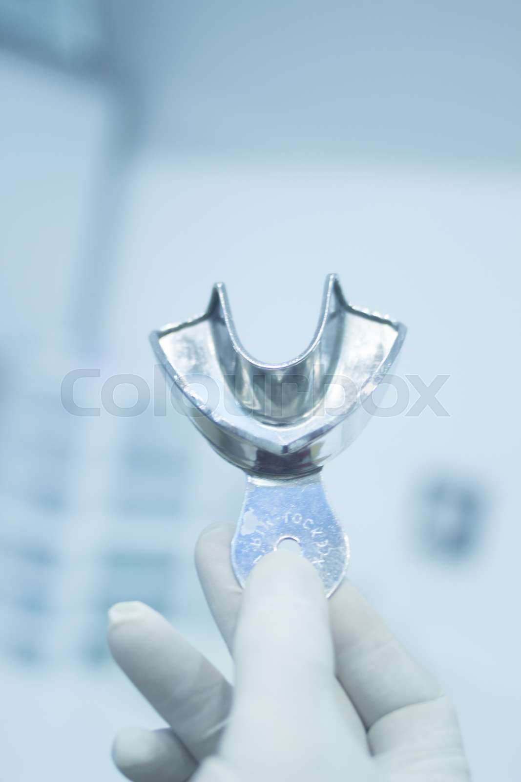 Dental mold dentists teeth ceramic plate cast | Stock image | Colourbox