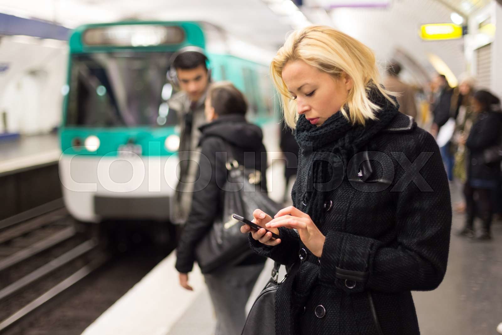 Woman on a subway station. | Stock image | Colourbox