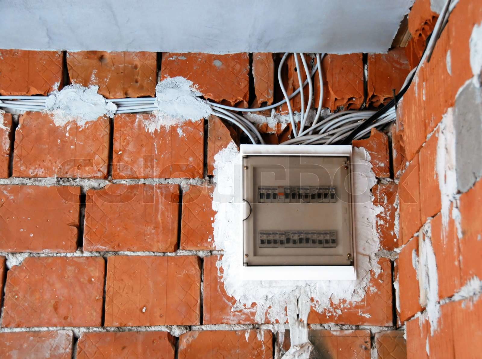electrical installations, safety fuses box on red brick wall | Stock ...