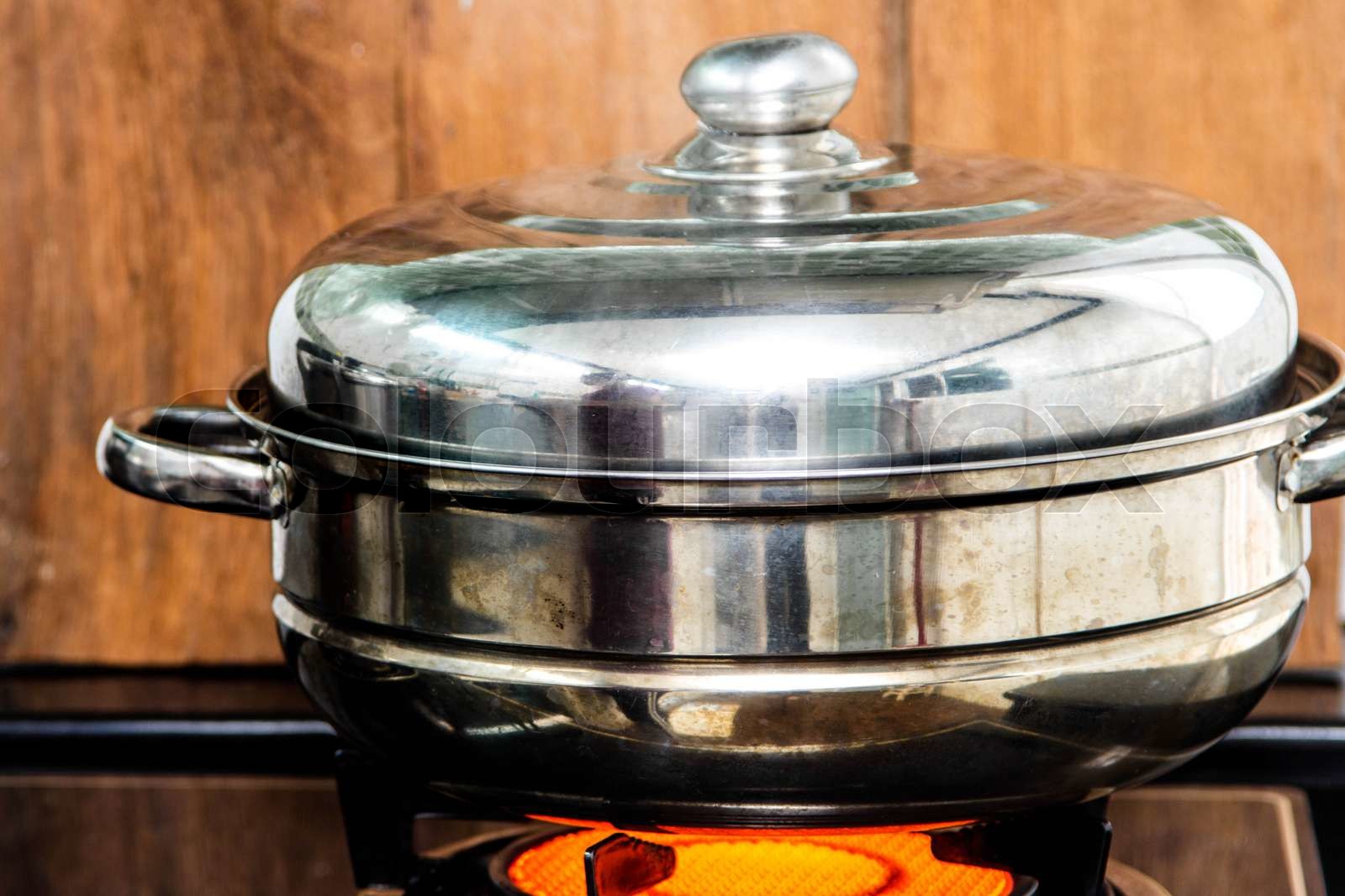 Pots and steaming pot | Stock image | Colourbox