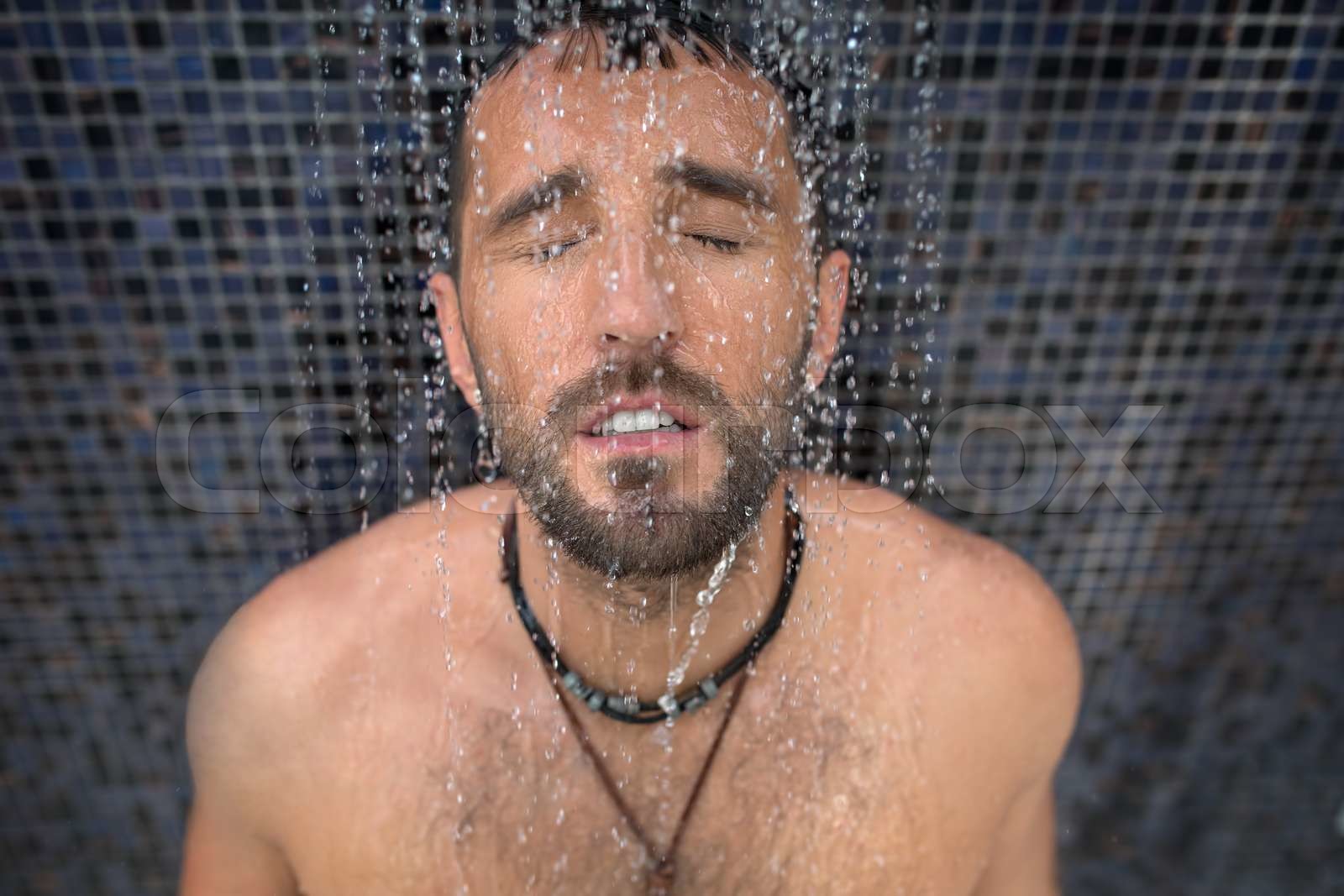 Man in shower | Stock image | Colourbox