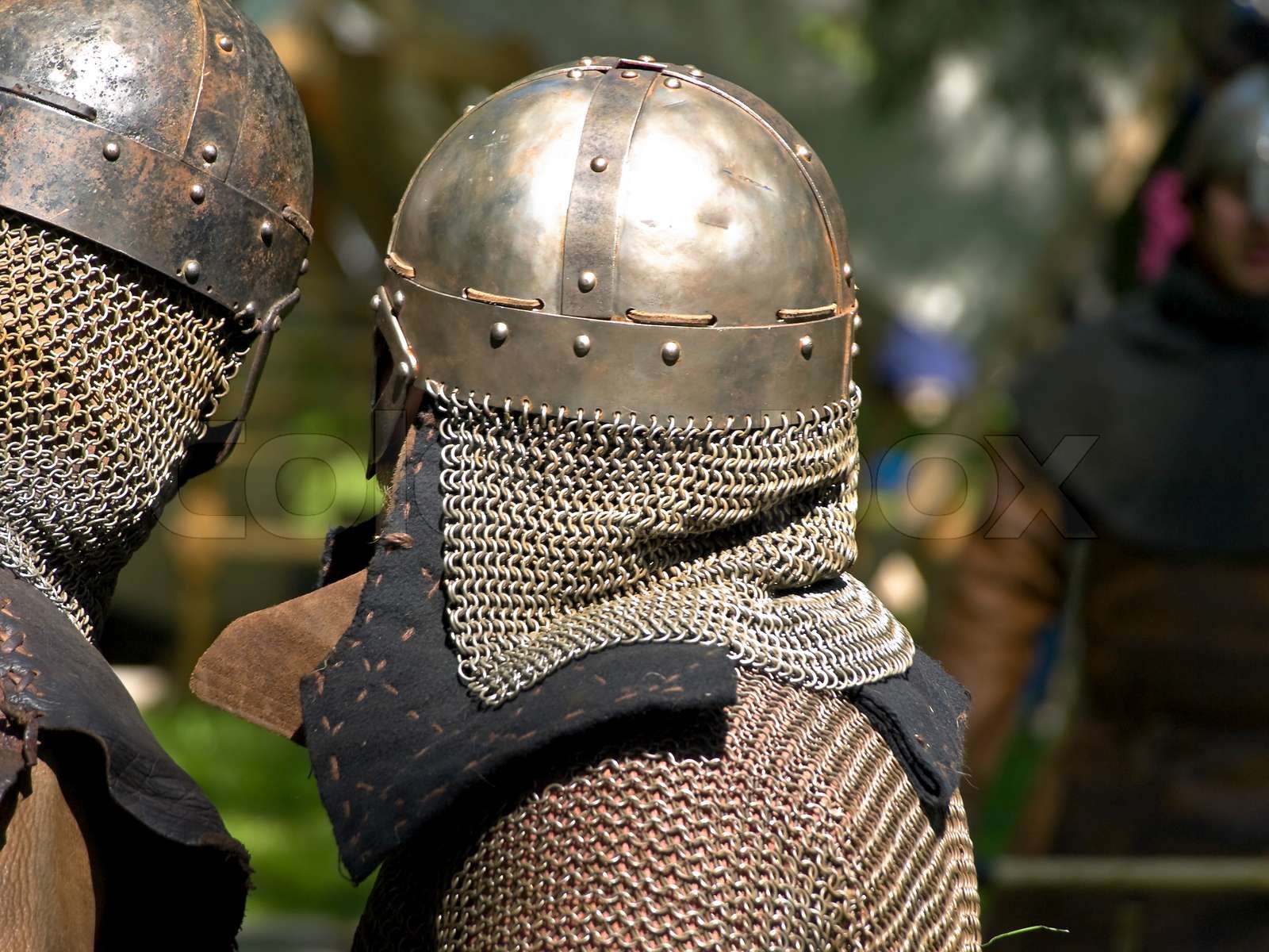 two talking armored knights at the park | Stock image | Colourbox