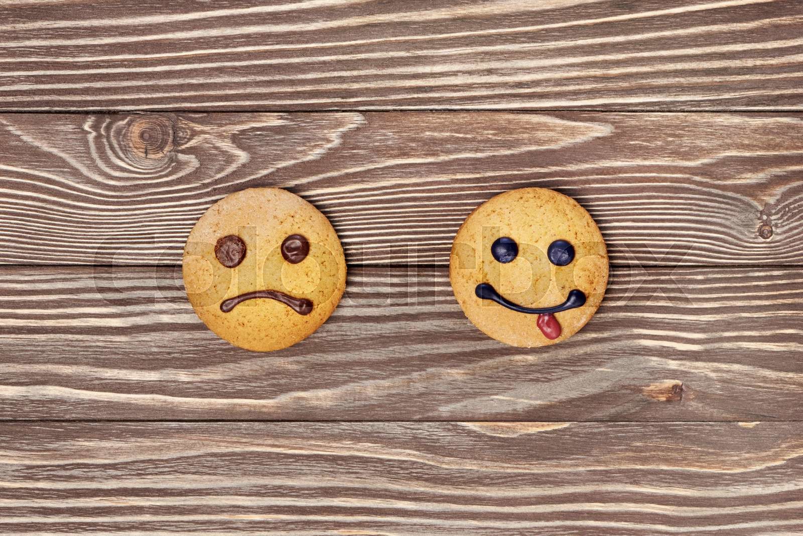 Smiling and sad cookies | Stock image | Colourbox