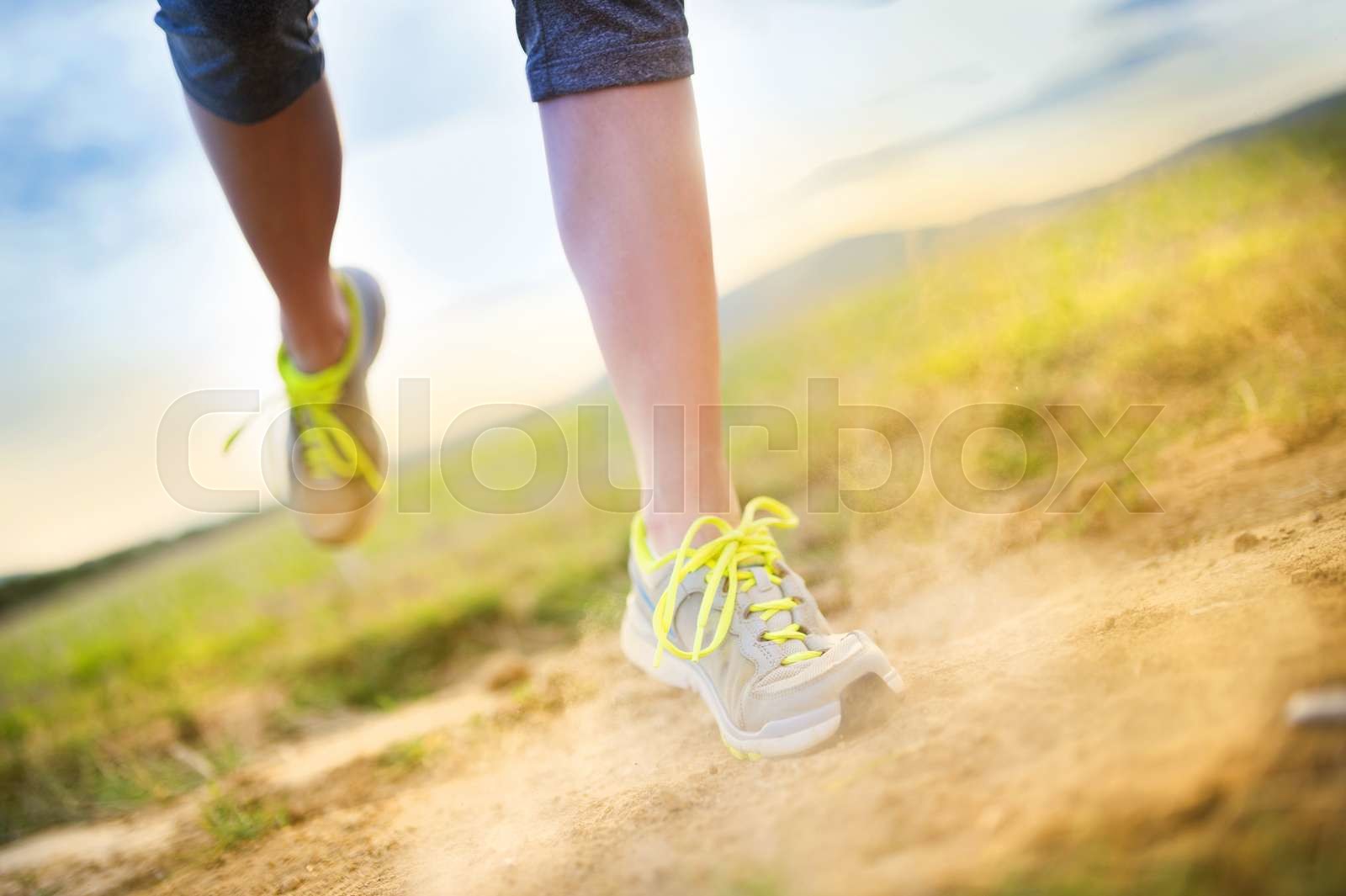 Woman running feet closeup | Stock image | Colourbox