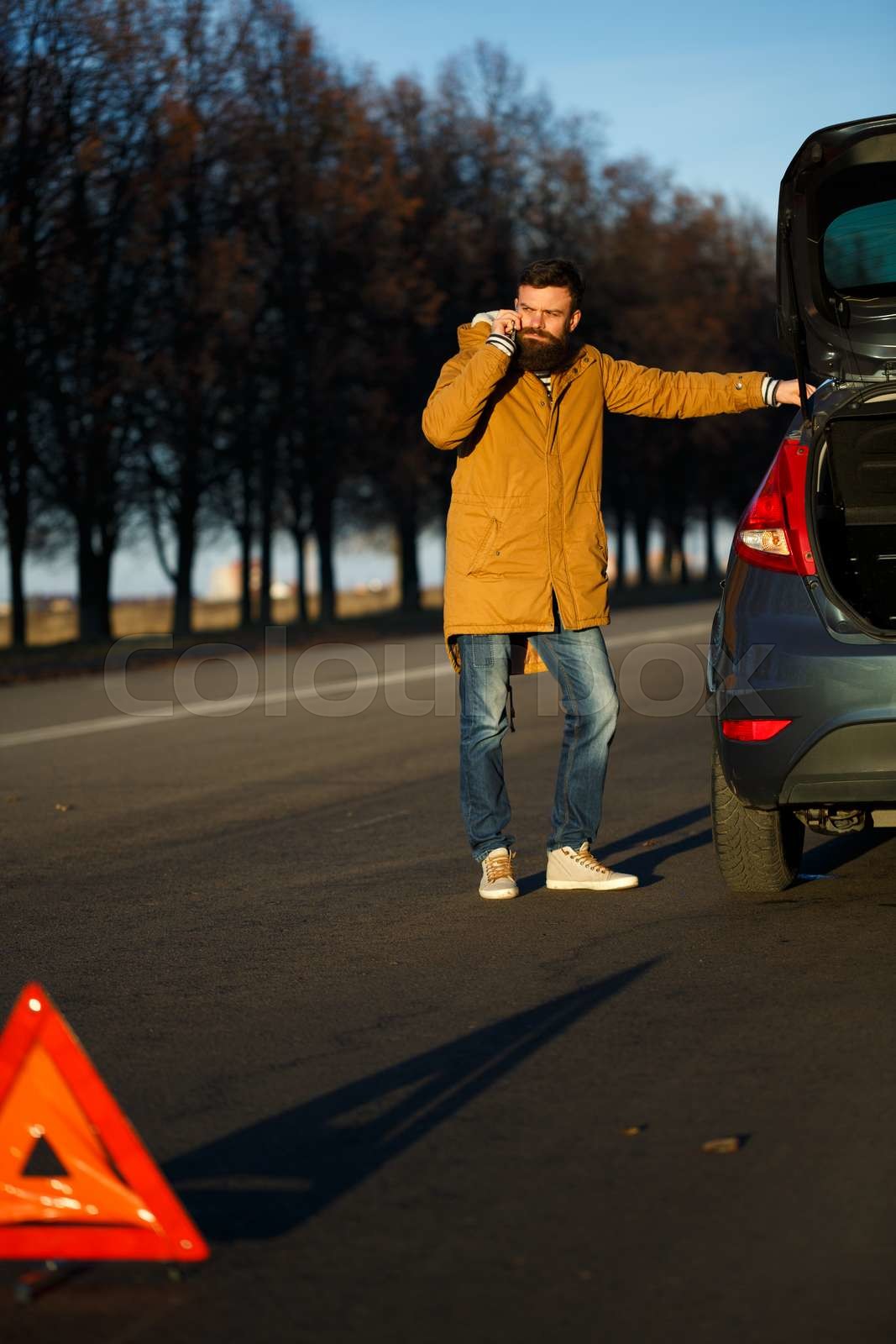 Man examining damaged automobile cars after breaking | Stock image ...