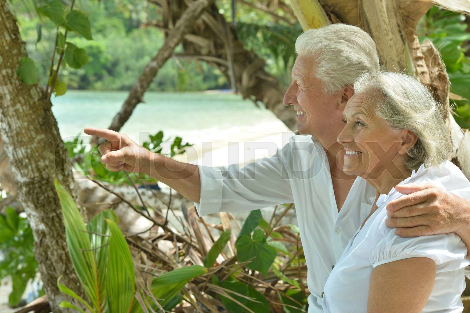 elderly couple rest at tropical resort | Stock image | Colourbox