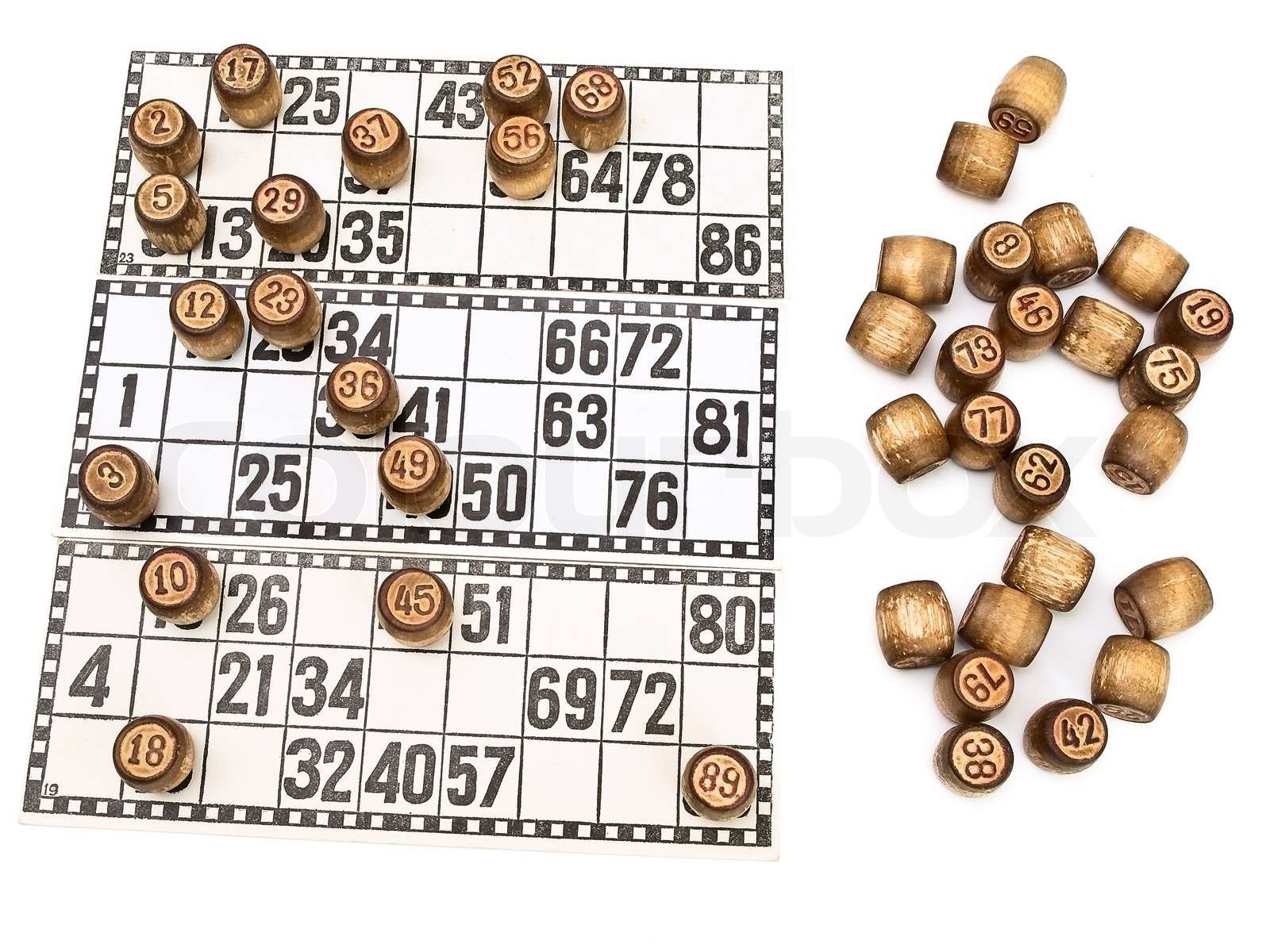 lotto white cards with numbers and small cask | Stock image | Colourbox