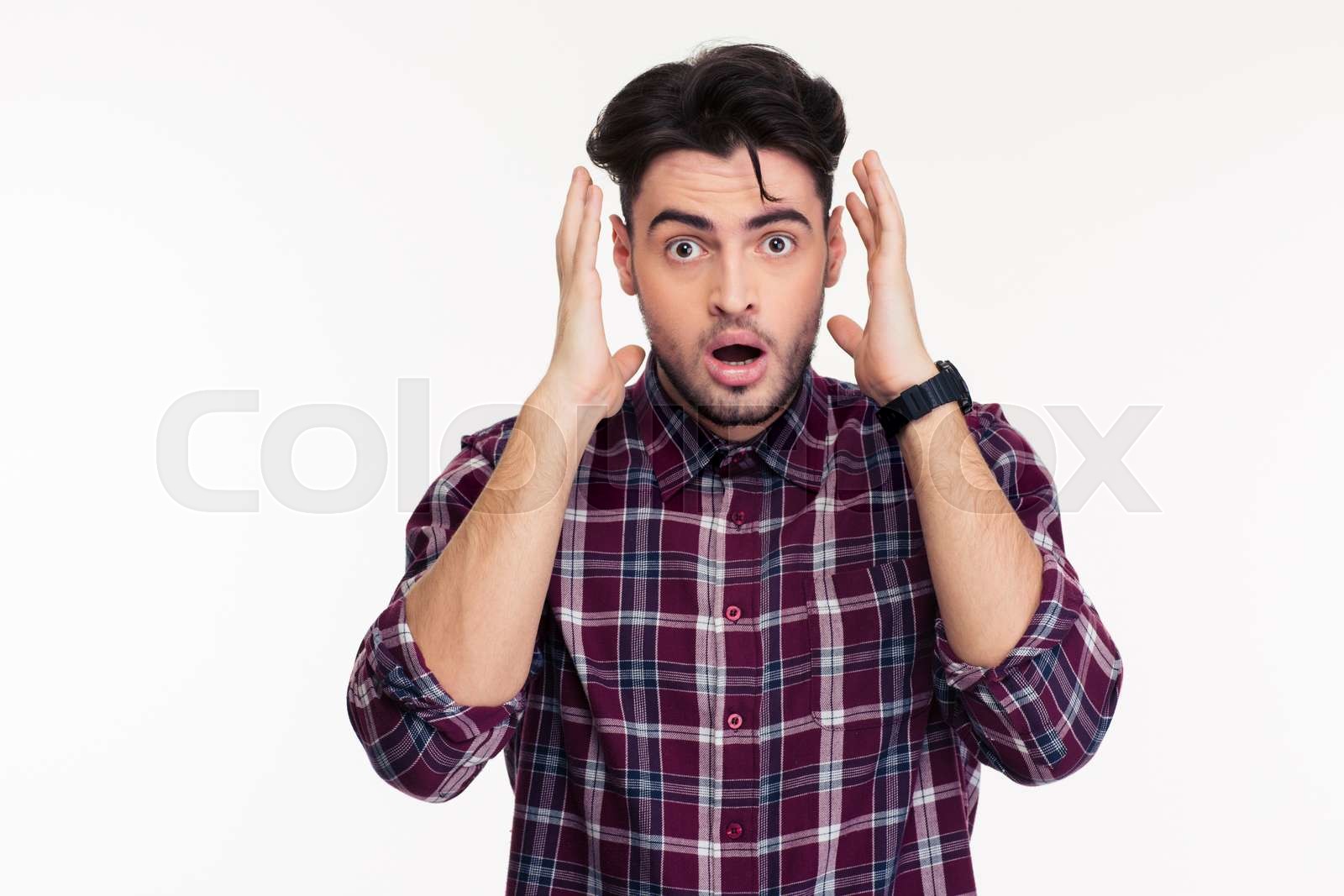 Portrait of a shocked man looking at camera | Stock image | Colourbox
