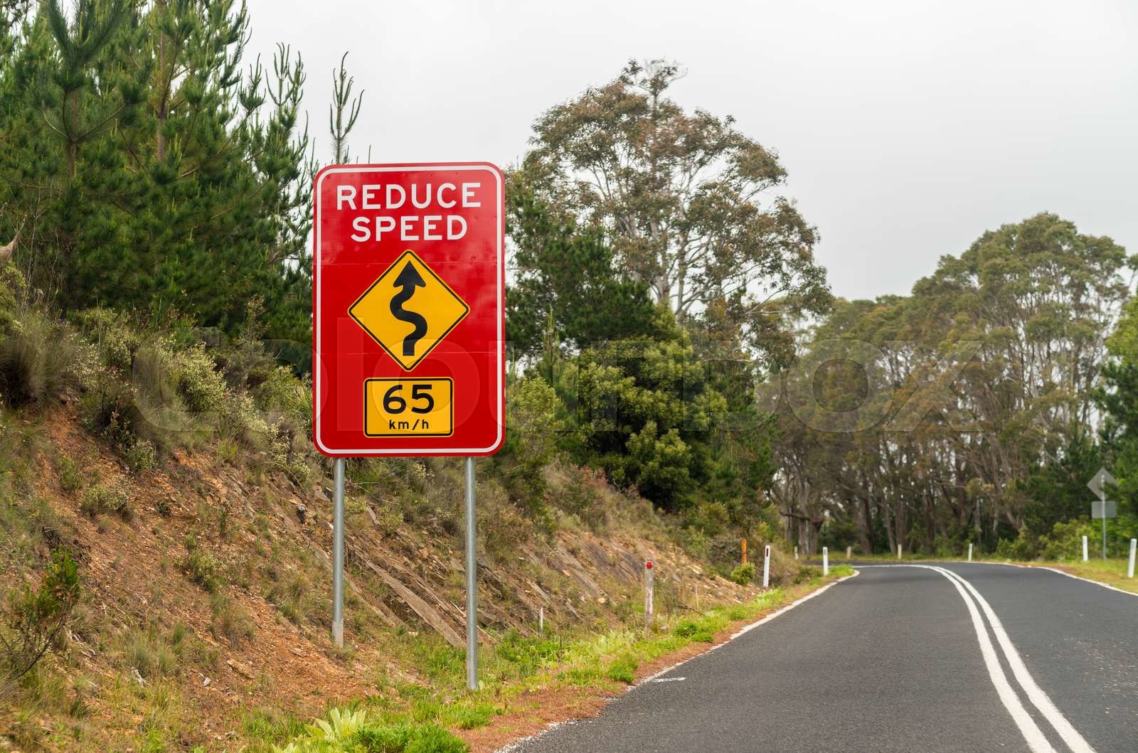 Reduce speed road sign | Stock image | Colourbox