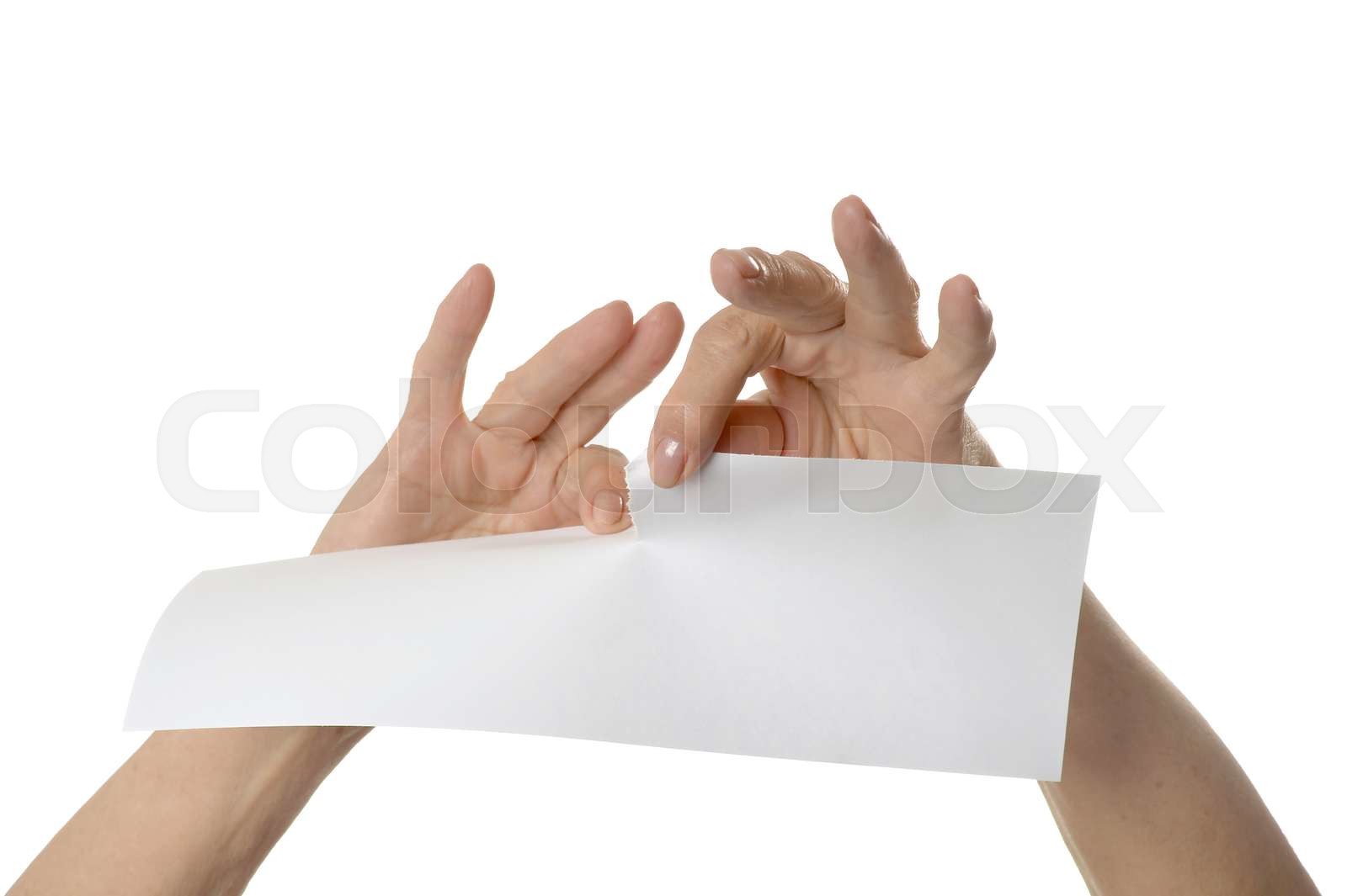 Hands tearing paper | Stock image | Colourbox