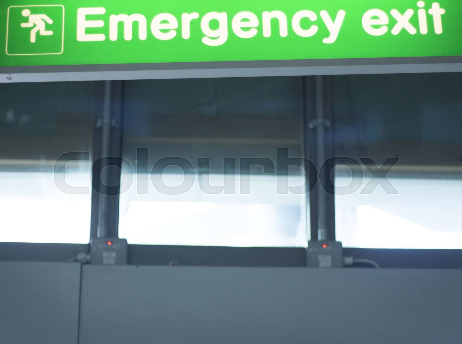 Airport information emergency exit sign | Stock image | Colourbox
