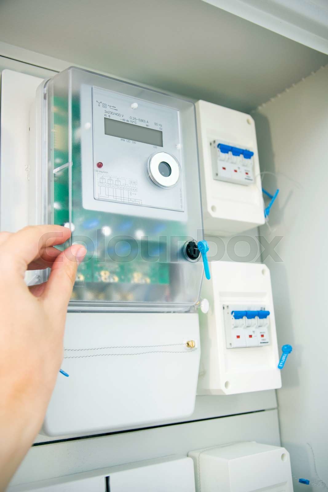 Modern electric meter close up view | Stock image | Colourbox