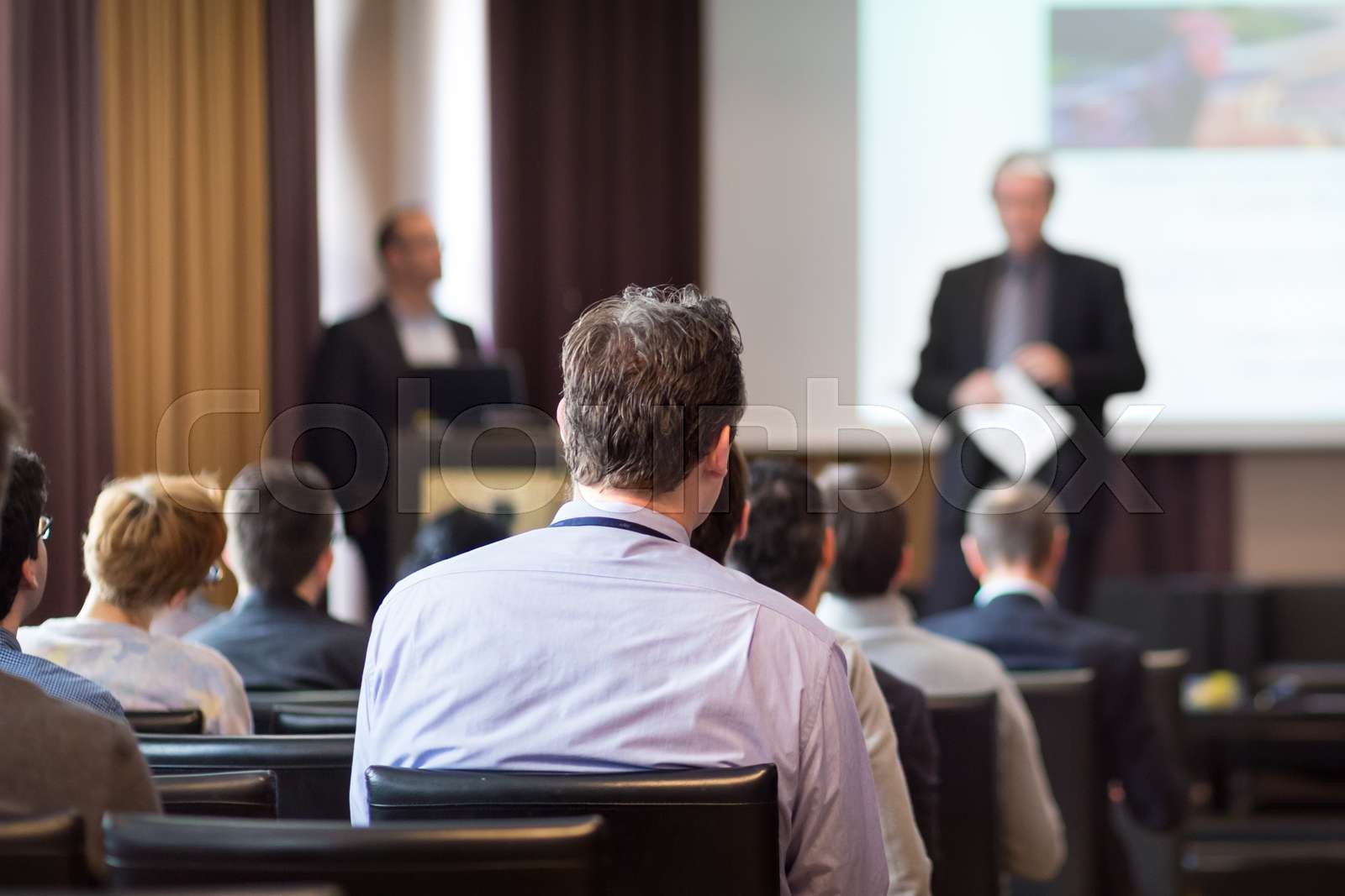 Audience in the lecture hall. | Stock image | Colourbox