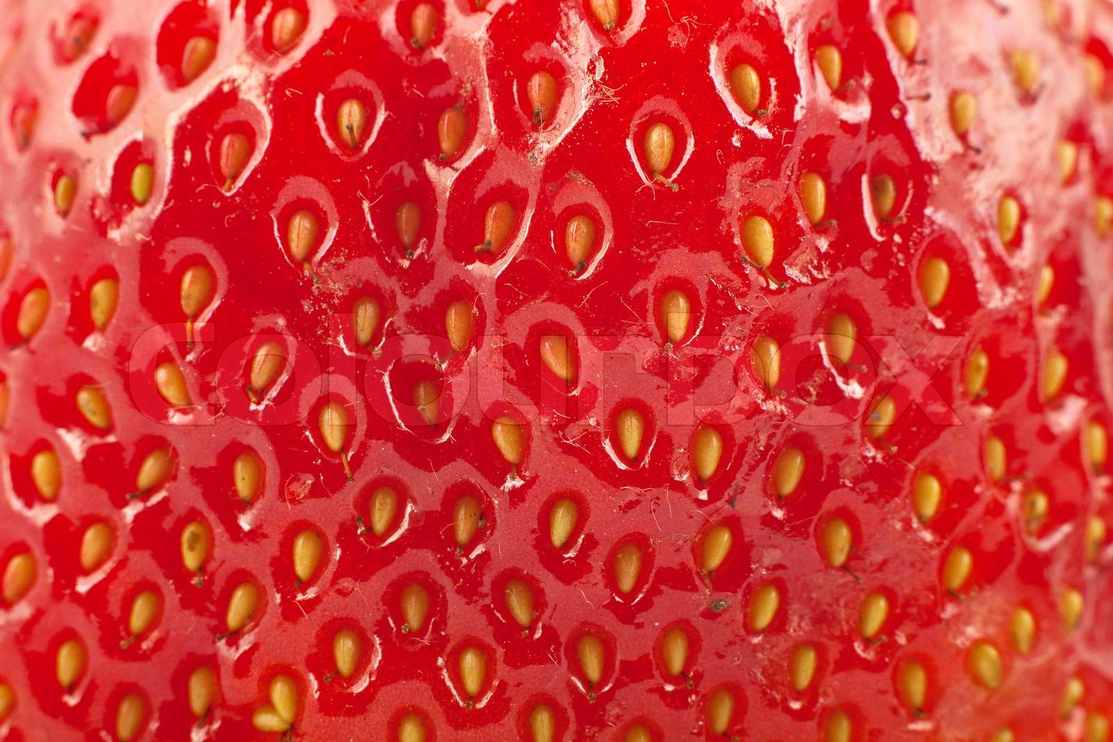 Detailed surface shot of a fresh strawberry. | Stock image | Colourbox