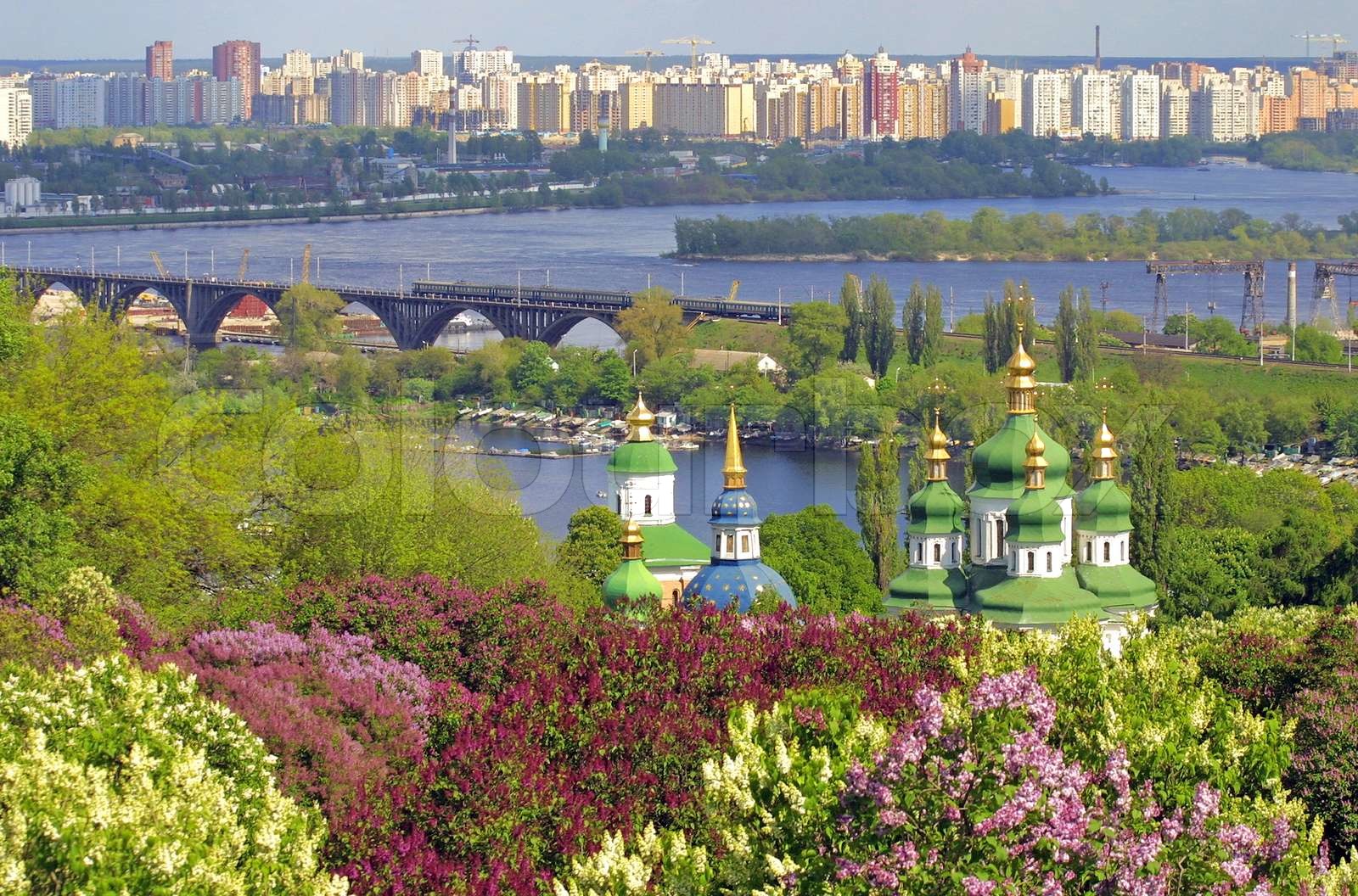 Kiev Botanic Garden in spring. View to the Vydubichi monastery and left ...