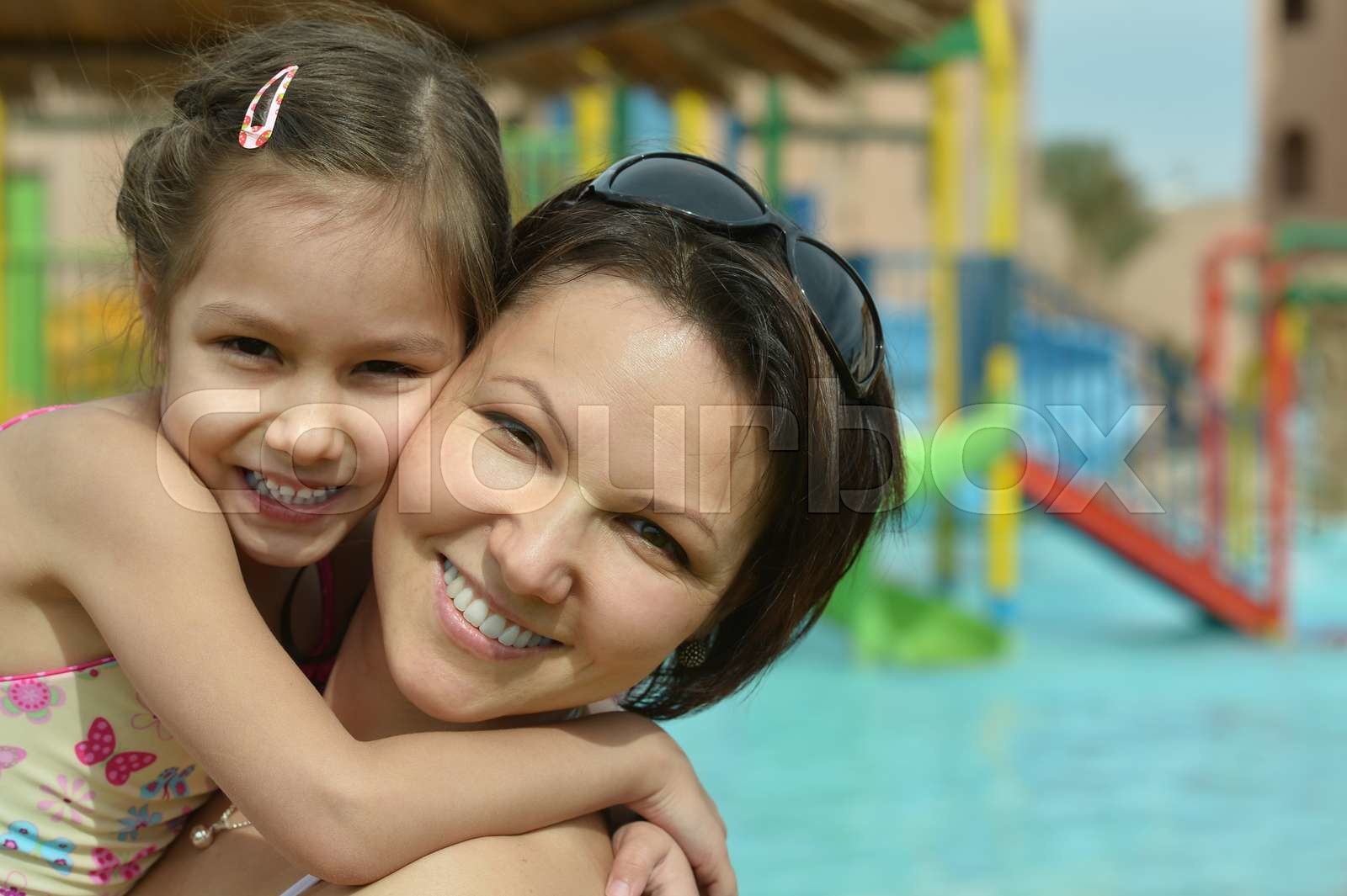 Mother With Daughter Near Pool Stock Image Colourbox mother-with-daughter-near-pool-stock-image-colourbox
