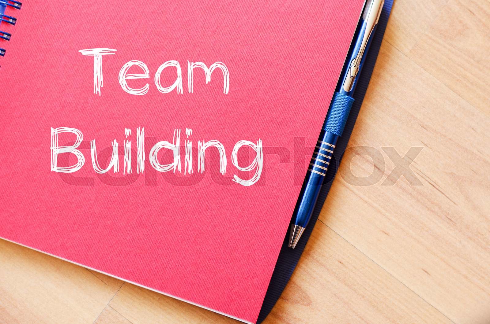 Team building write on notebook | Stock image | Colourbox