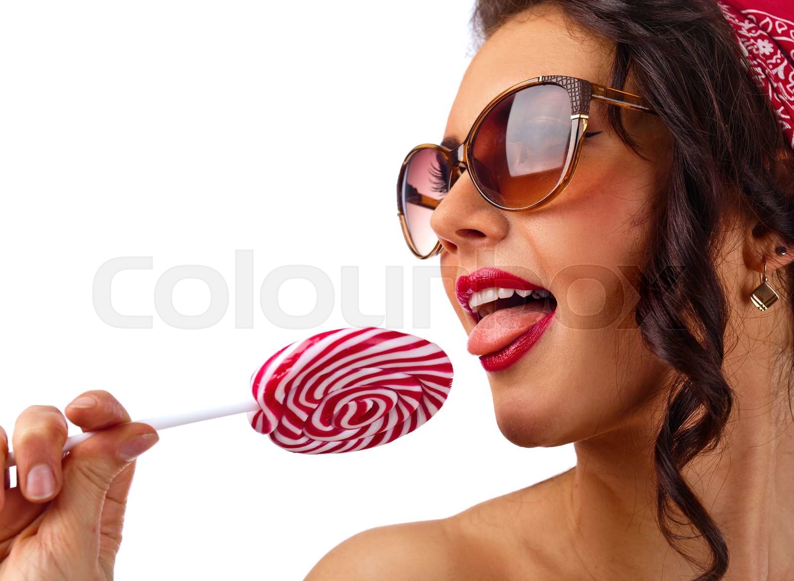 young beautiful woman with candy | Stock image | Colourbox