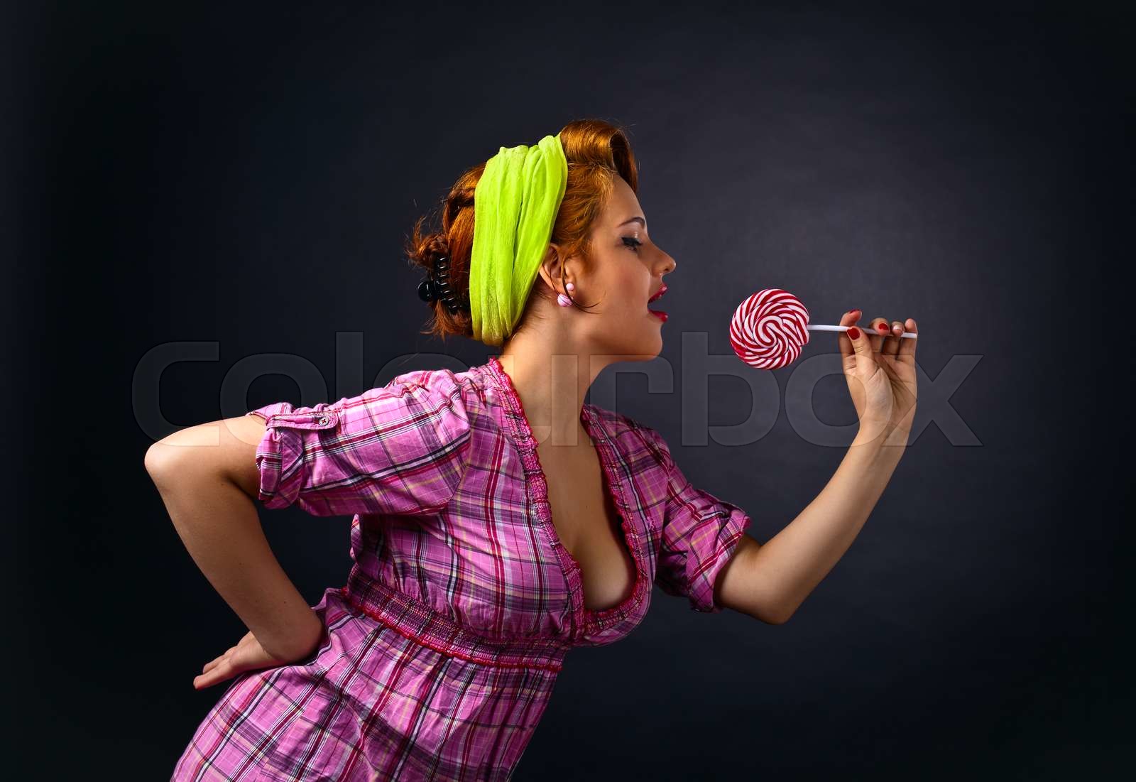 young beautiful woman with candy | Stock image | Colourbox