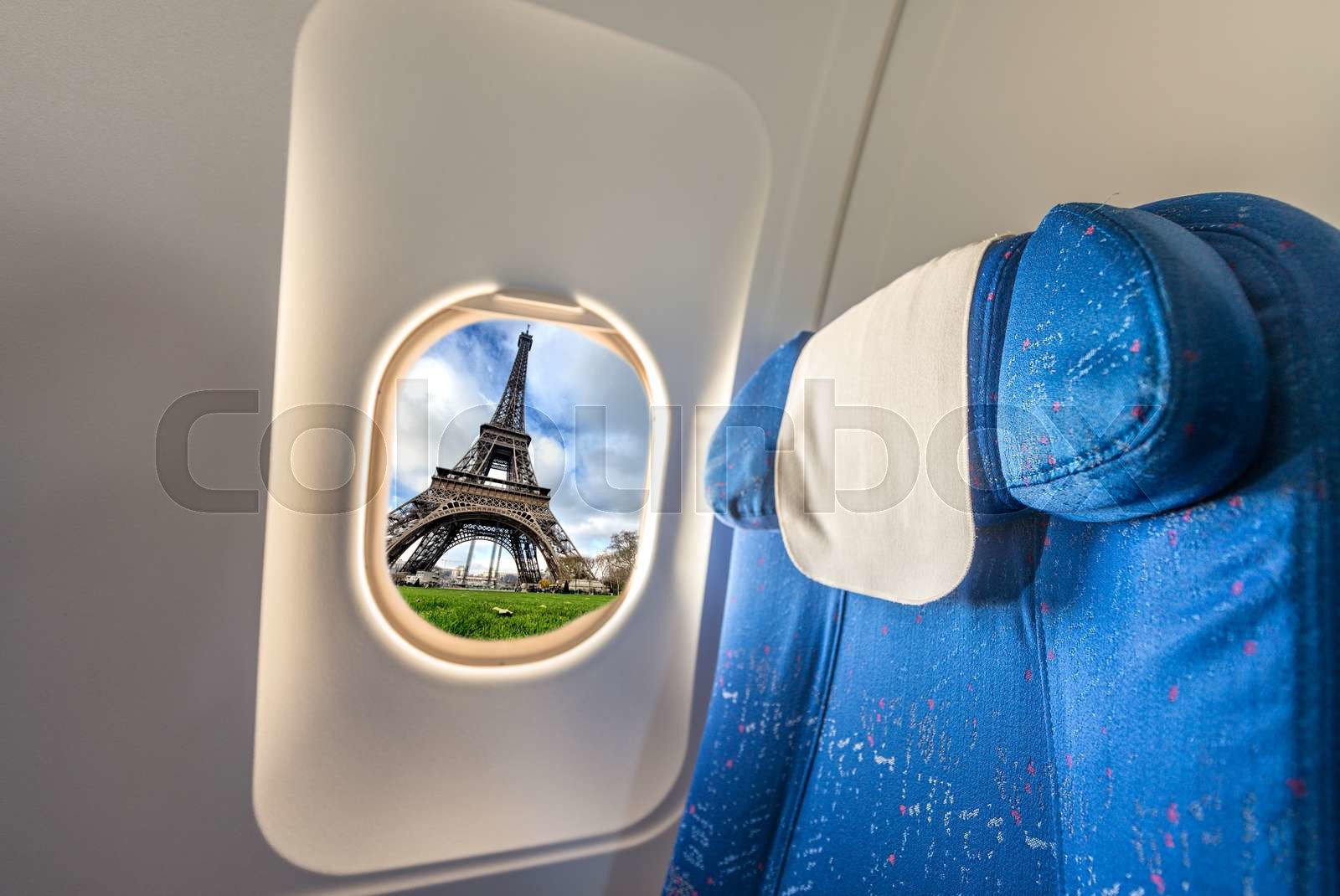 Eiffel Tower as seen from airplane window. Paris tourism concept ...