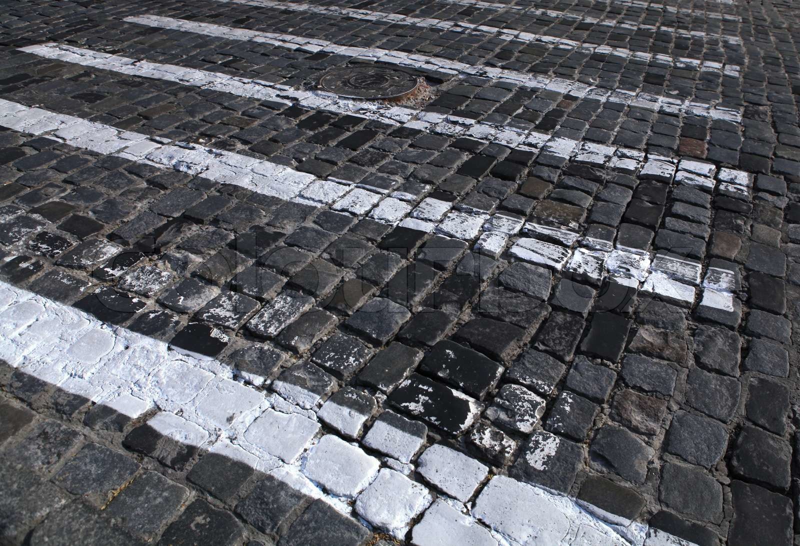 paving stones texture with painted white pedestrian crossing | Stock ...