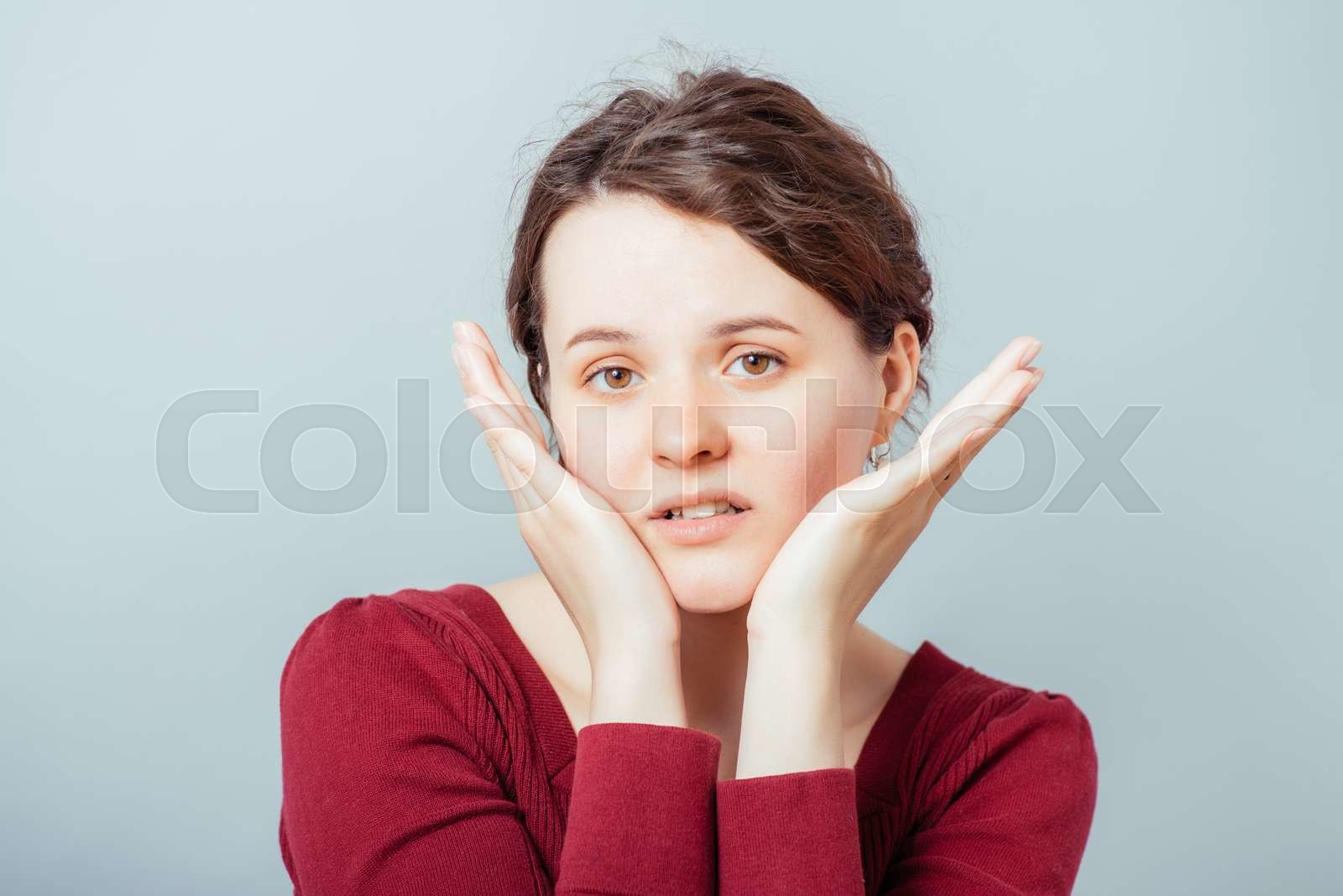 Girl unpleasantly surprised | Stock image | Colourbox