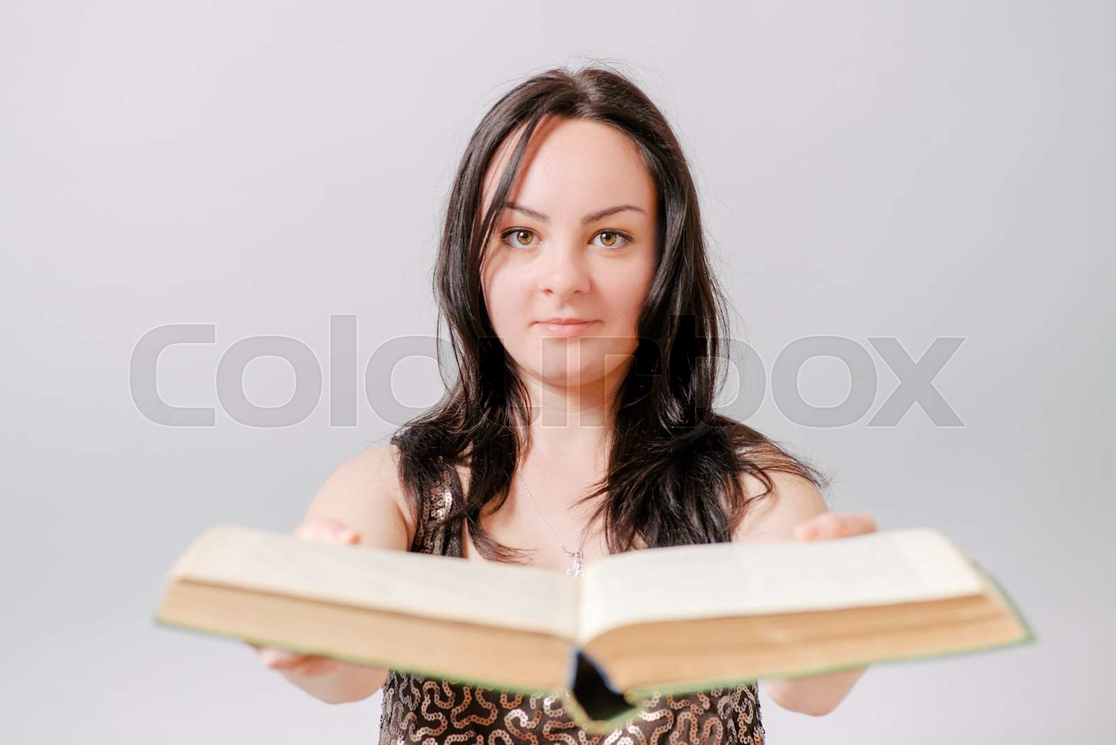 young girl with books in their hands | Stock image | Colourbox