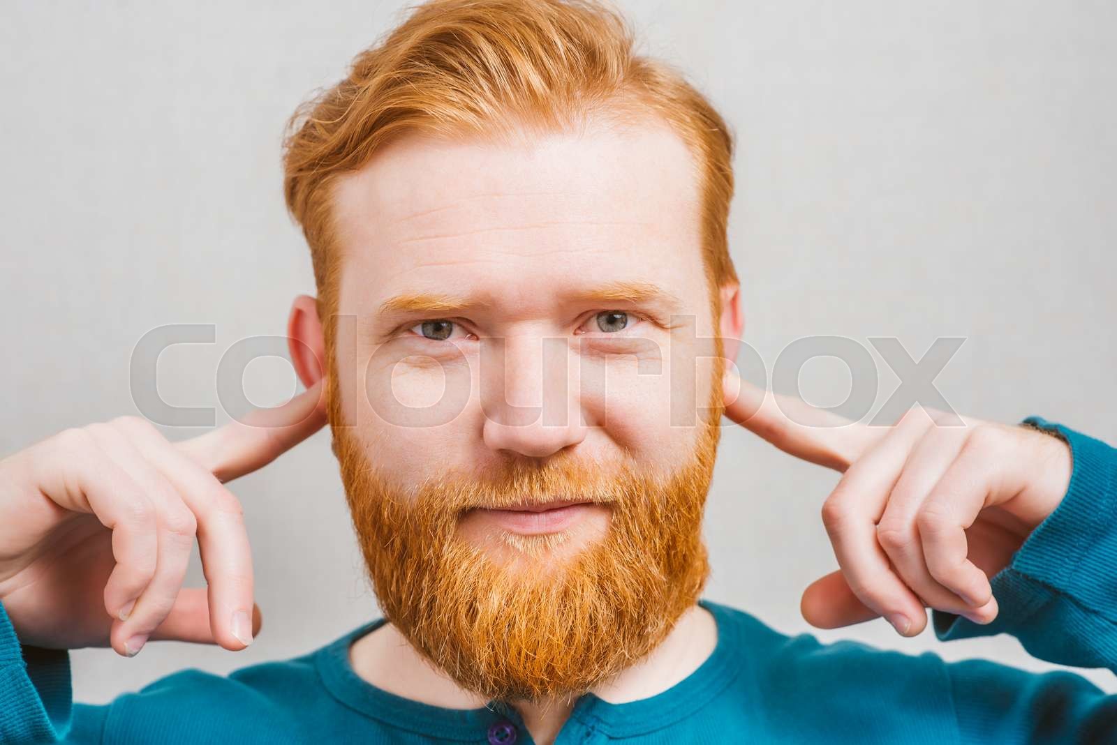 man covers his ears | Stock image | Colourbox