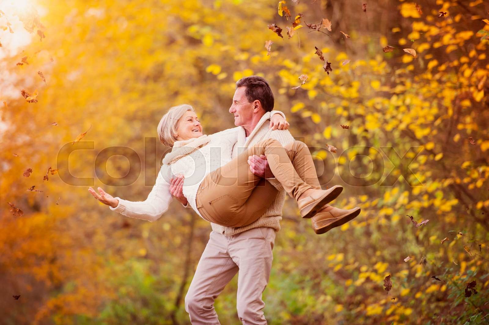 Active seniors having fun in nature | Stock image | Colourbox