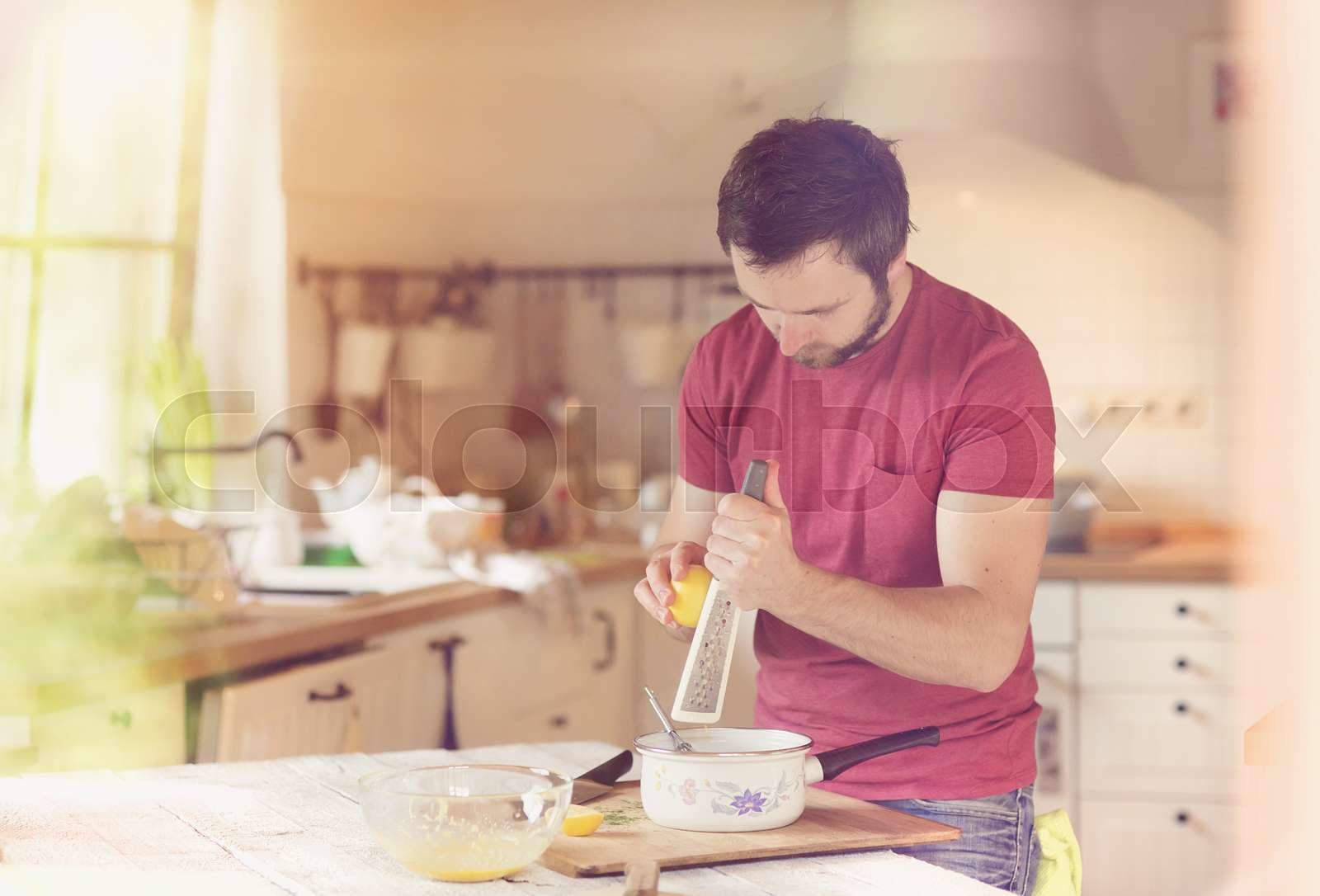 Man preparing a sauce | Stock image | Colourbox