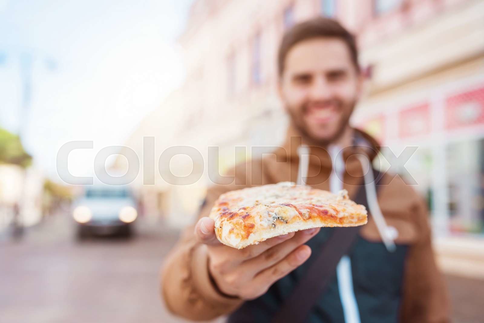 Man eating pizza | Stock image | Colourbox