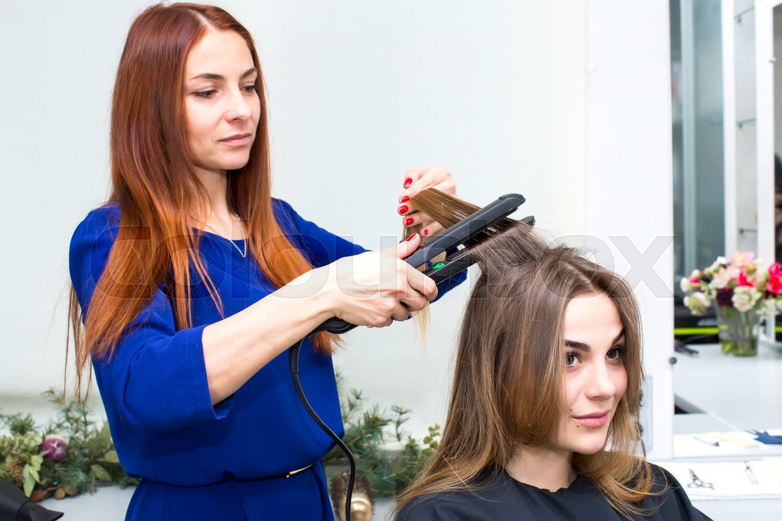woman in a beauty salon doing hair | Stock image | Colourbox