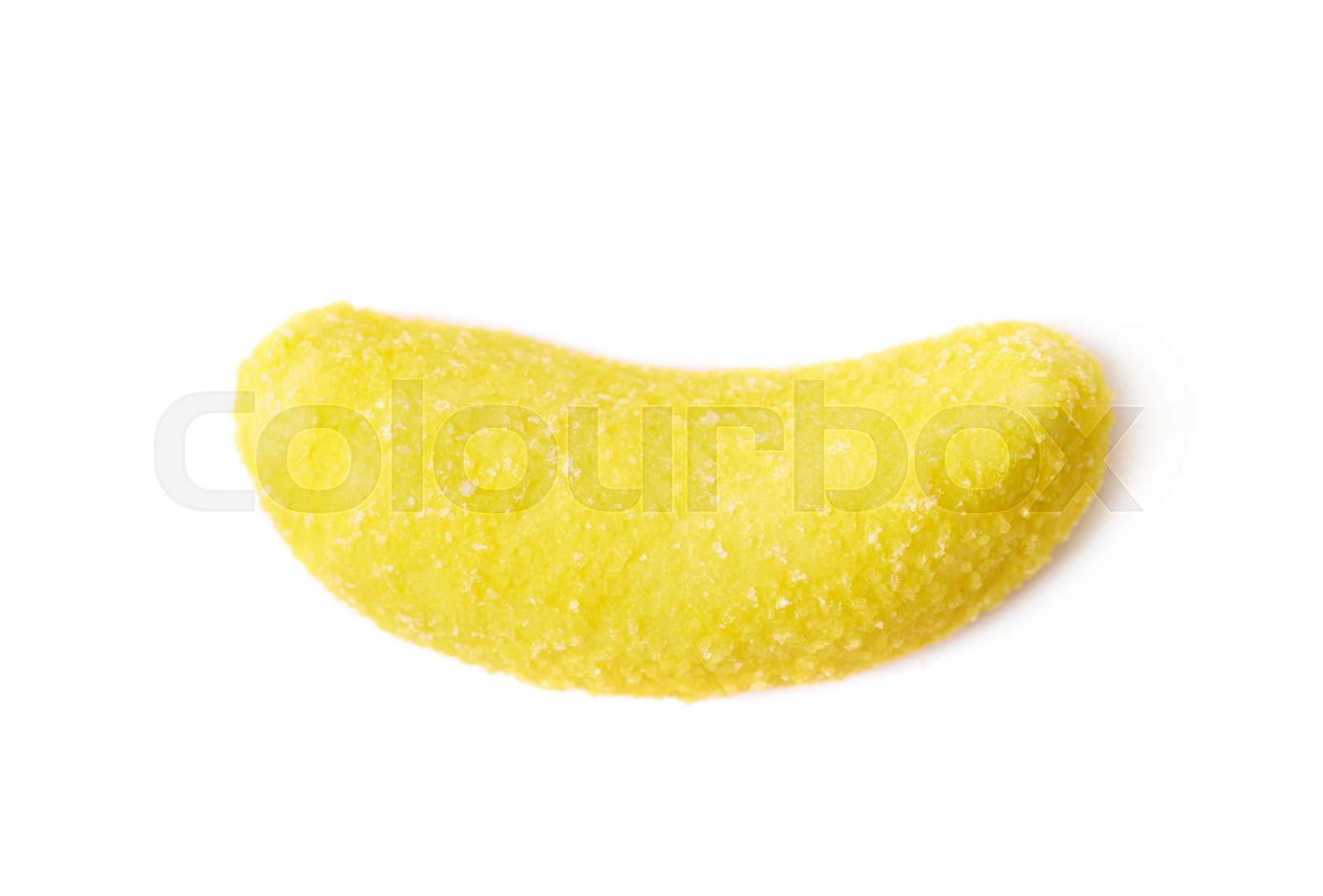 Banana shaped chewing candy isolated | Stock image | Colourbox