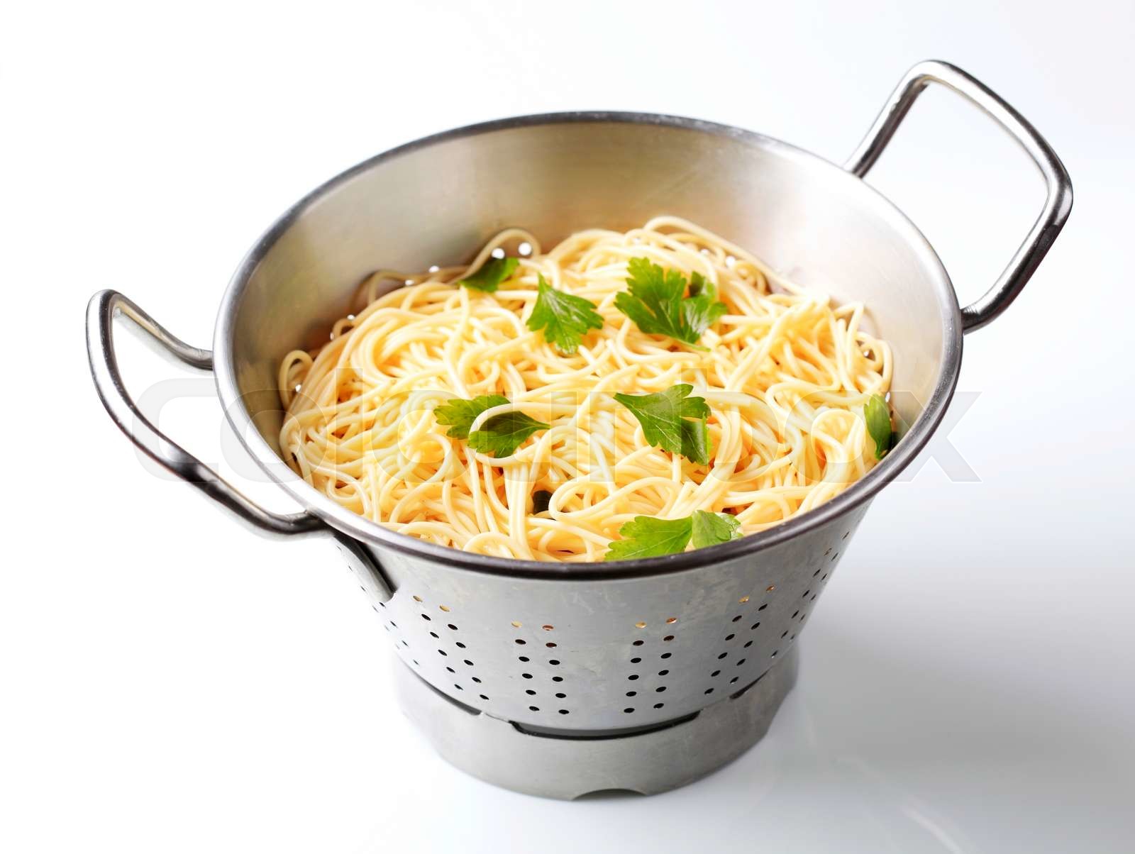 Spaghetti in a colander | Stock image | Colourbox