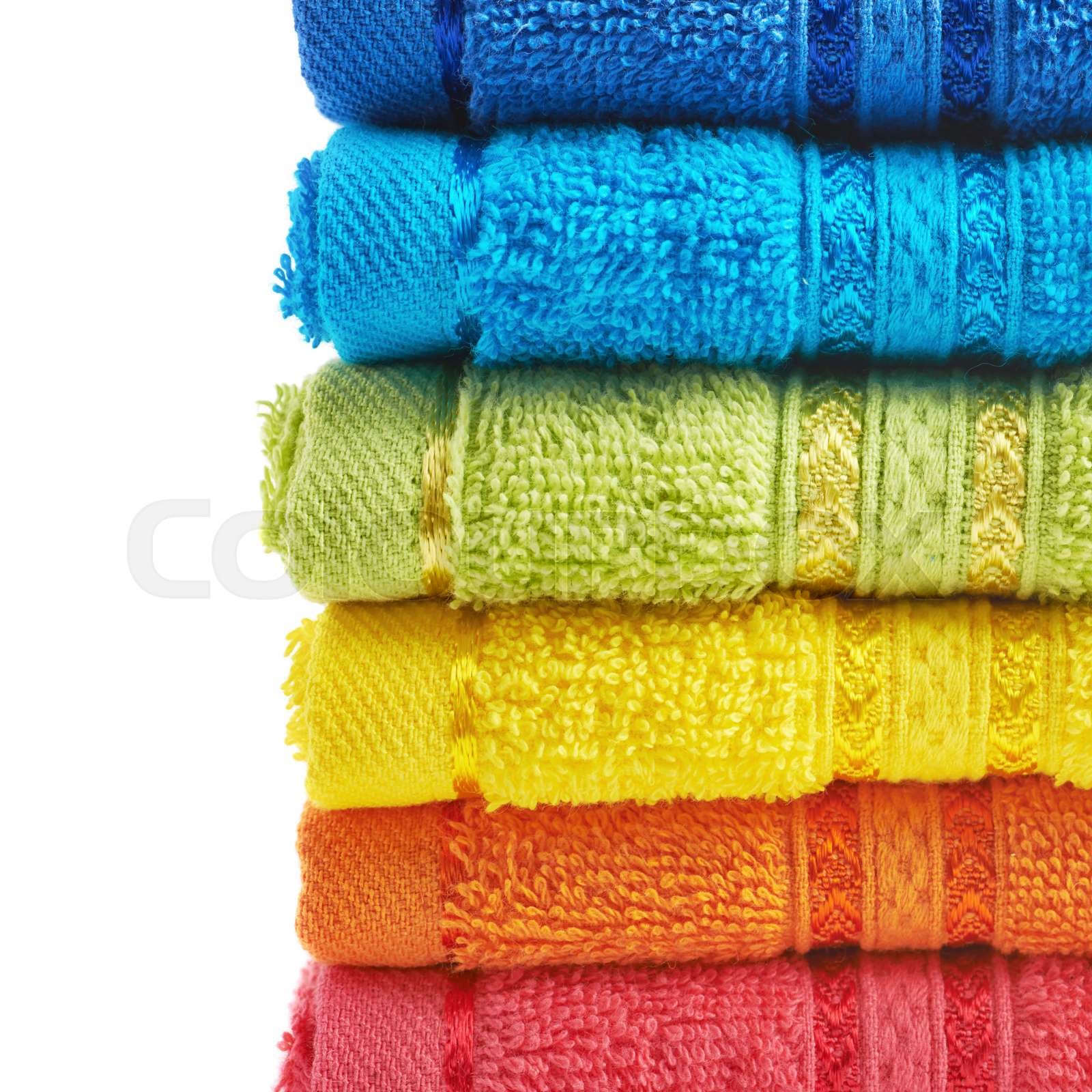 Pile of rainbow colored towels isolated | Stock image | Colourbox