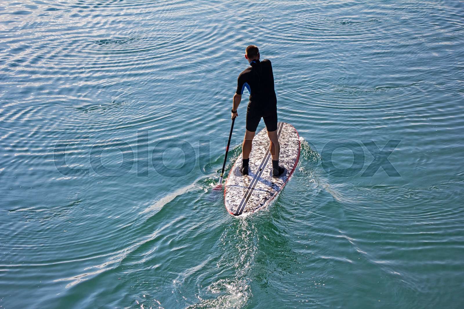 Stand up paddle boarder | Stock image | Colourbox