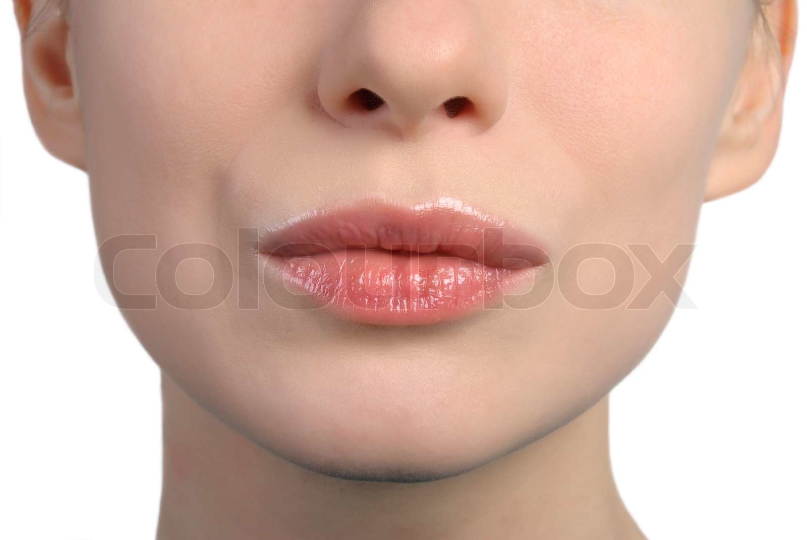 close up shot of a woman's lips kissing | Stock image | Colourbox