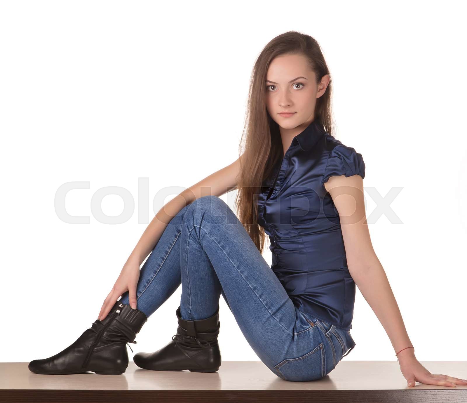 Pretty girl sits | Stock image | Colourbox