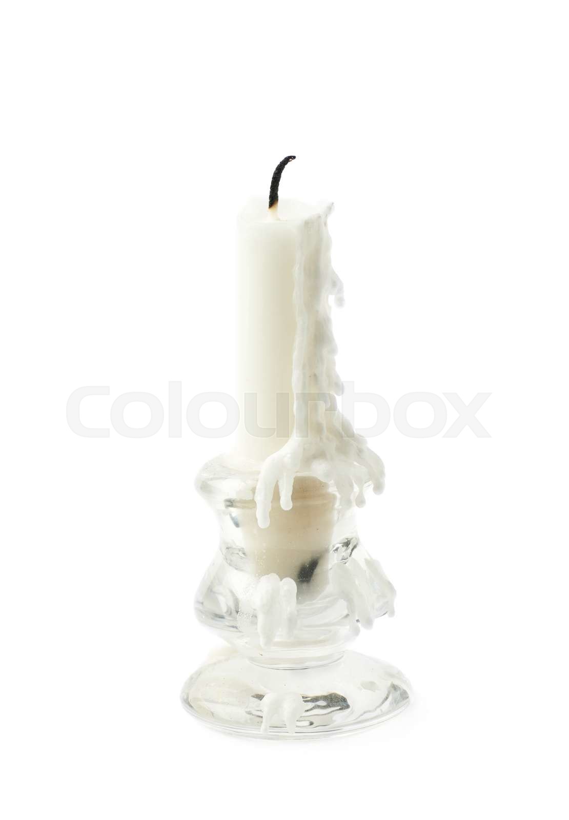 Burnt candle in candlestick isolated | Stock image | Colourbox