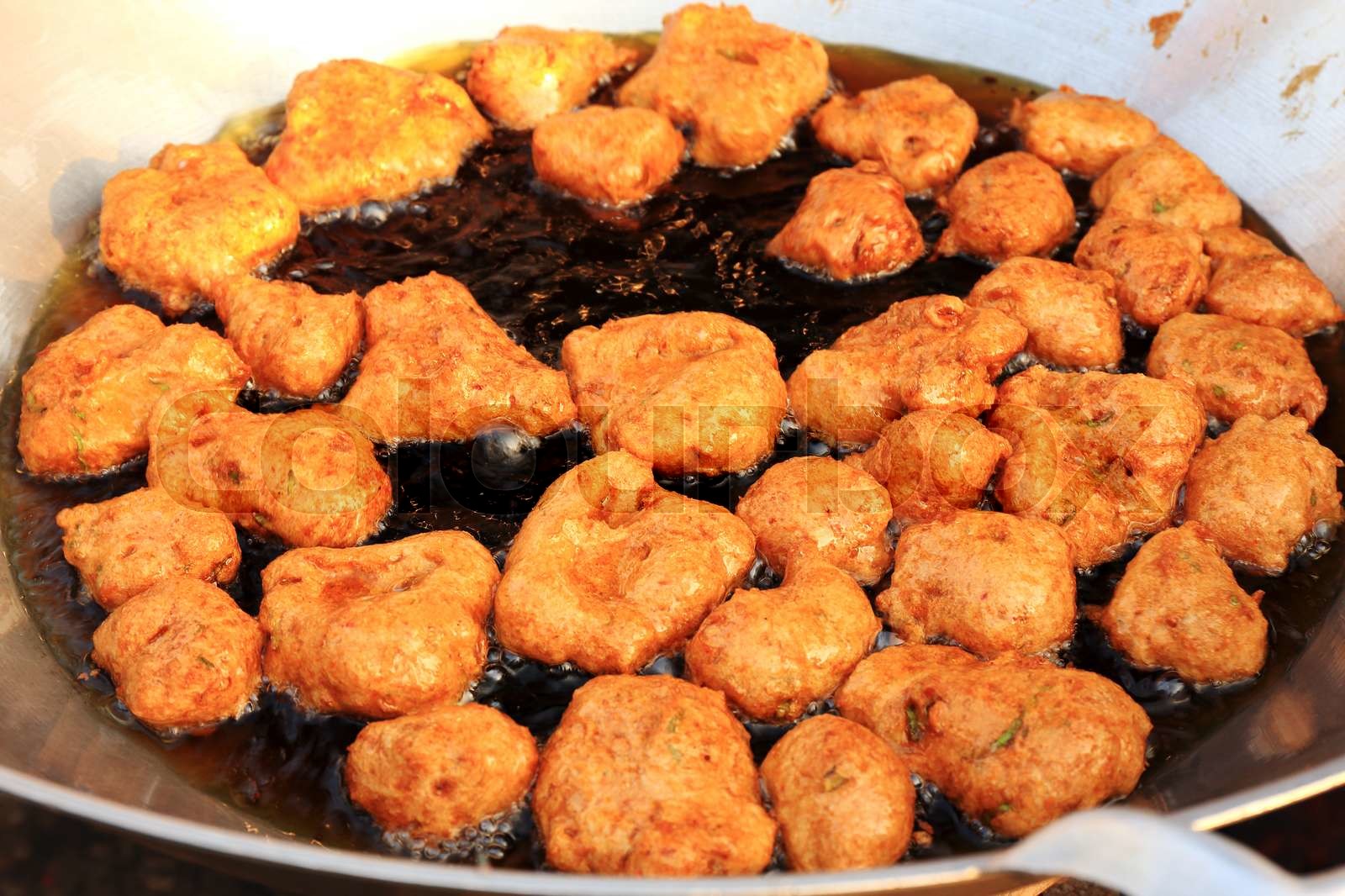Deep frying fish cake | Stock image | Colourbox