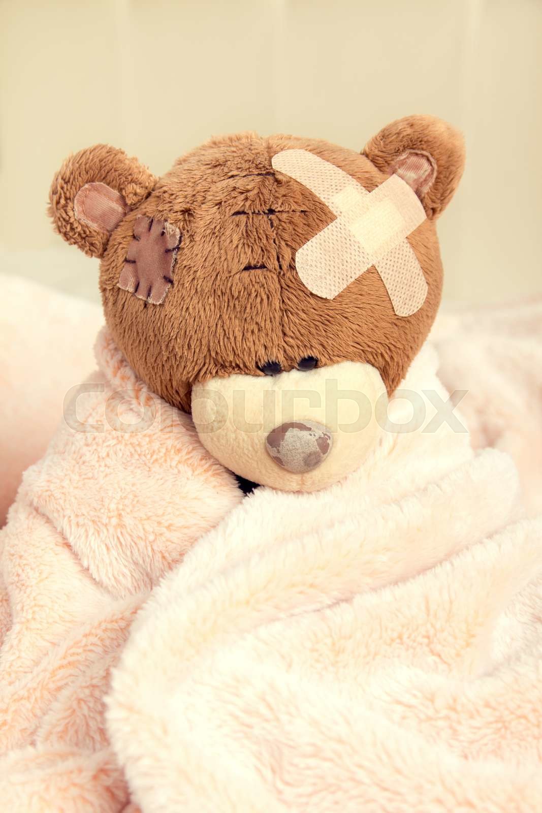 Sick teddy bear | Stock image | Colourbox