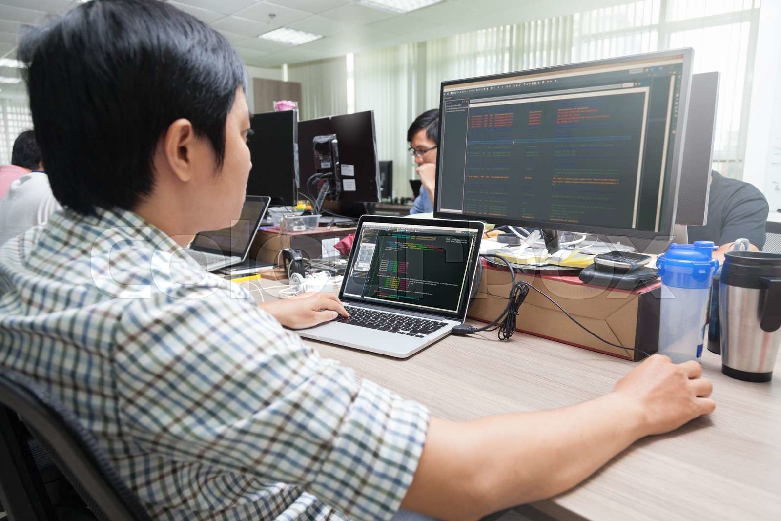 Asian Developer Using Laptop Computer Sitting Working | Stock image ... Asian Developer Using Laptop Computer Sitting Working | Stock image ...
