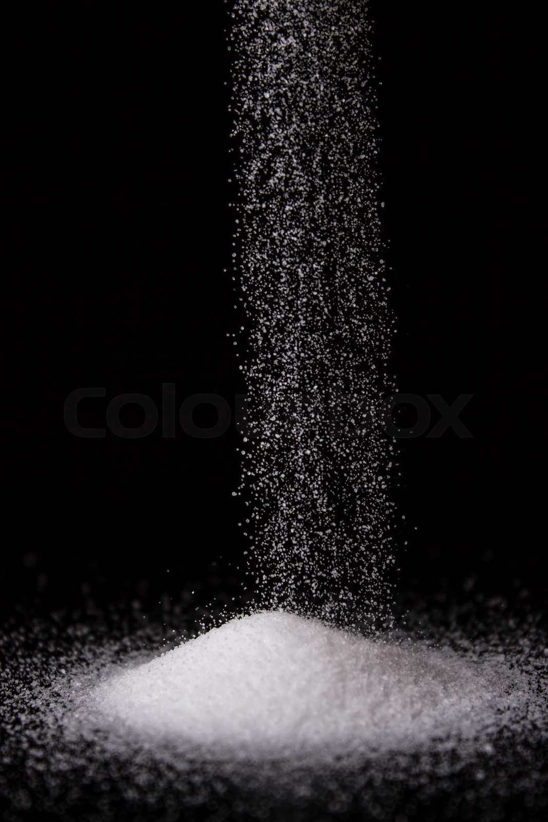 Salt Falling into a Pile | Stock image | Colourbox