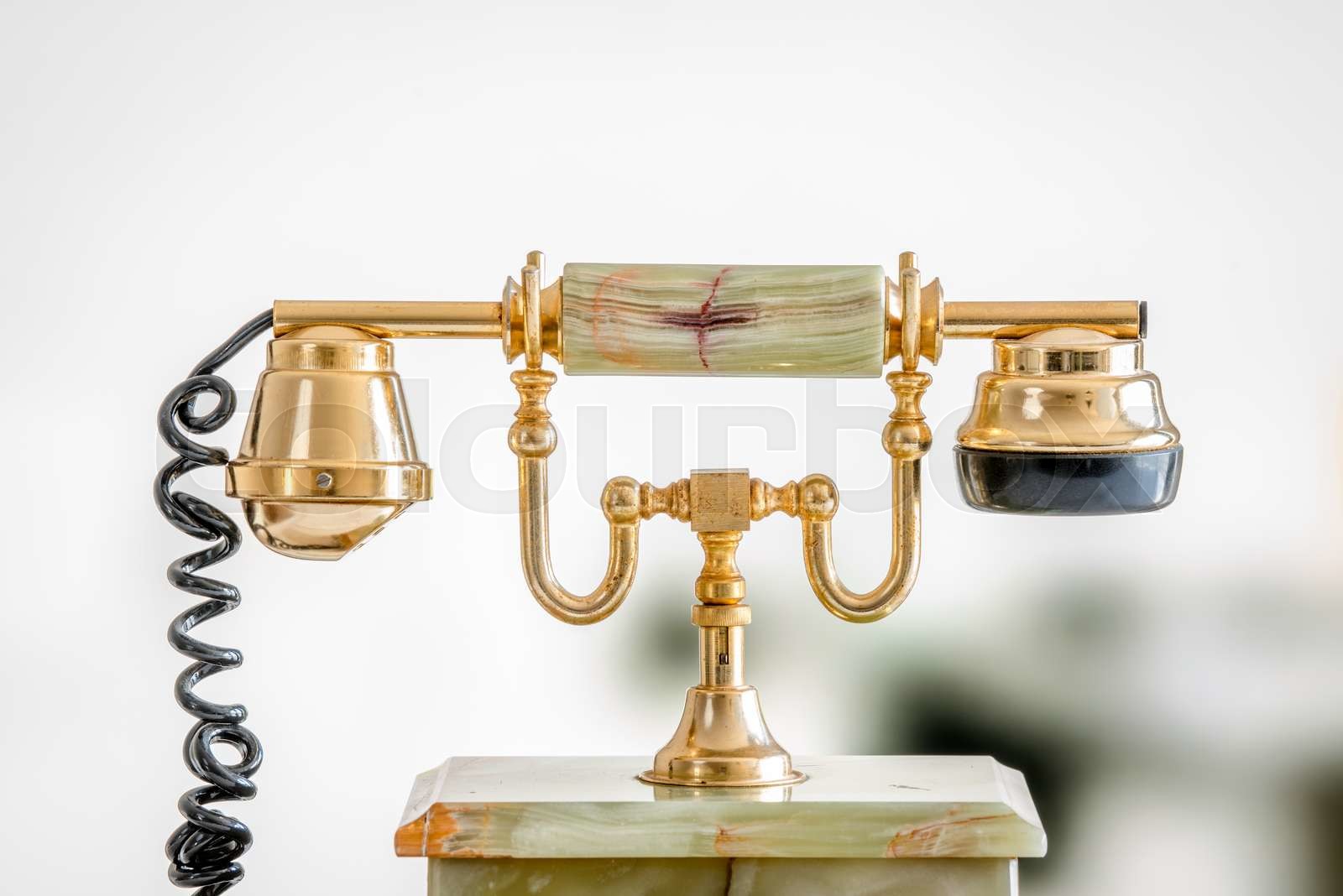 Antik telefon med guld og marmor | Stock foto | Colourbox