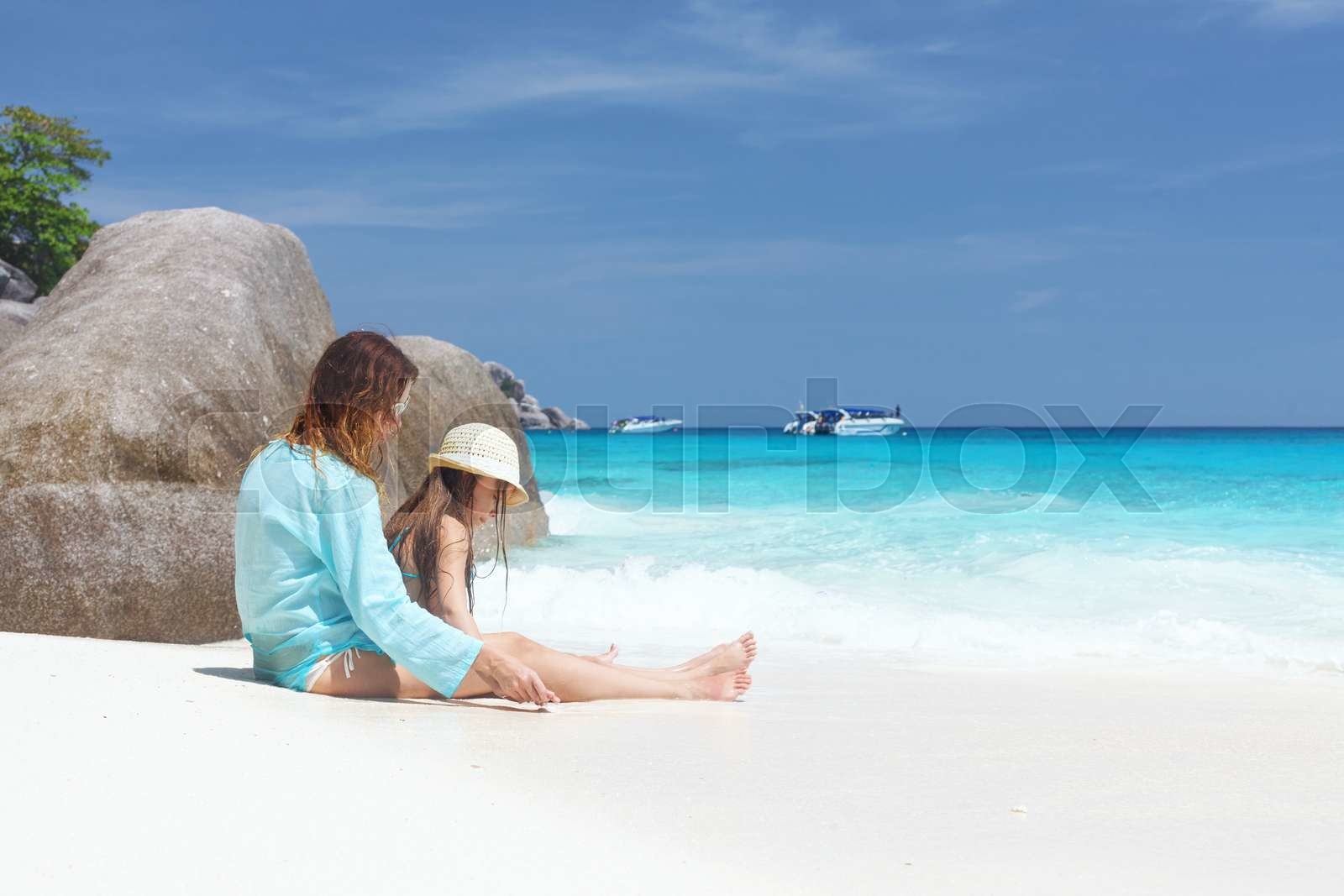 Child on a beach | Stock image | Colourbox