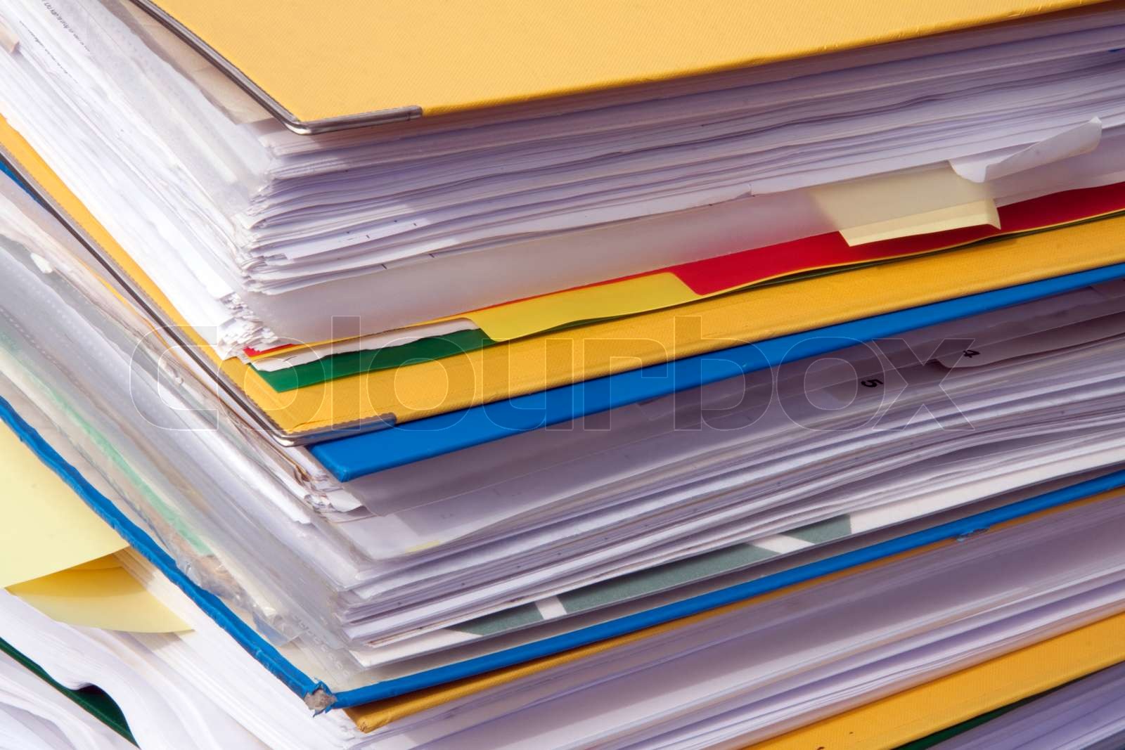 Stacked office folders and binders | Stock image | Colourbox