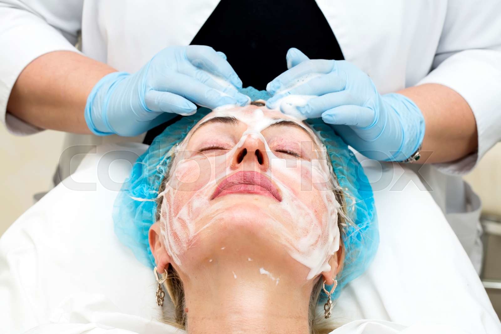 Cosmetic treatment with injection in a clinic | Stock image | Colourbox