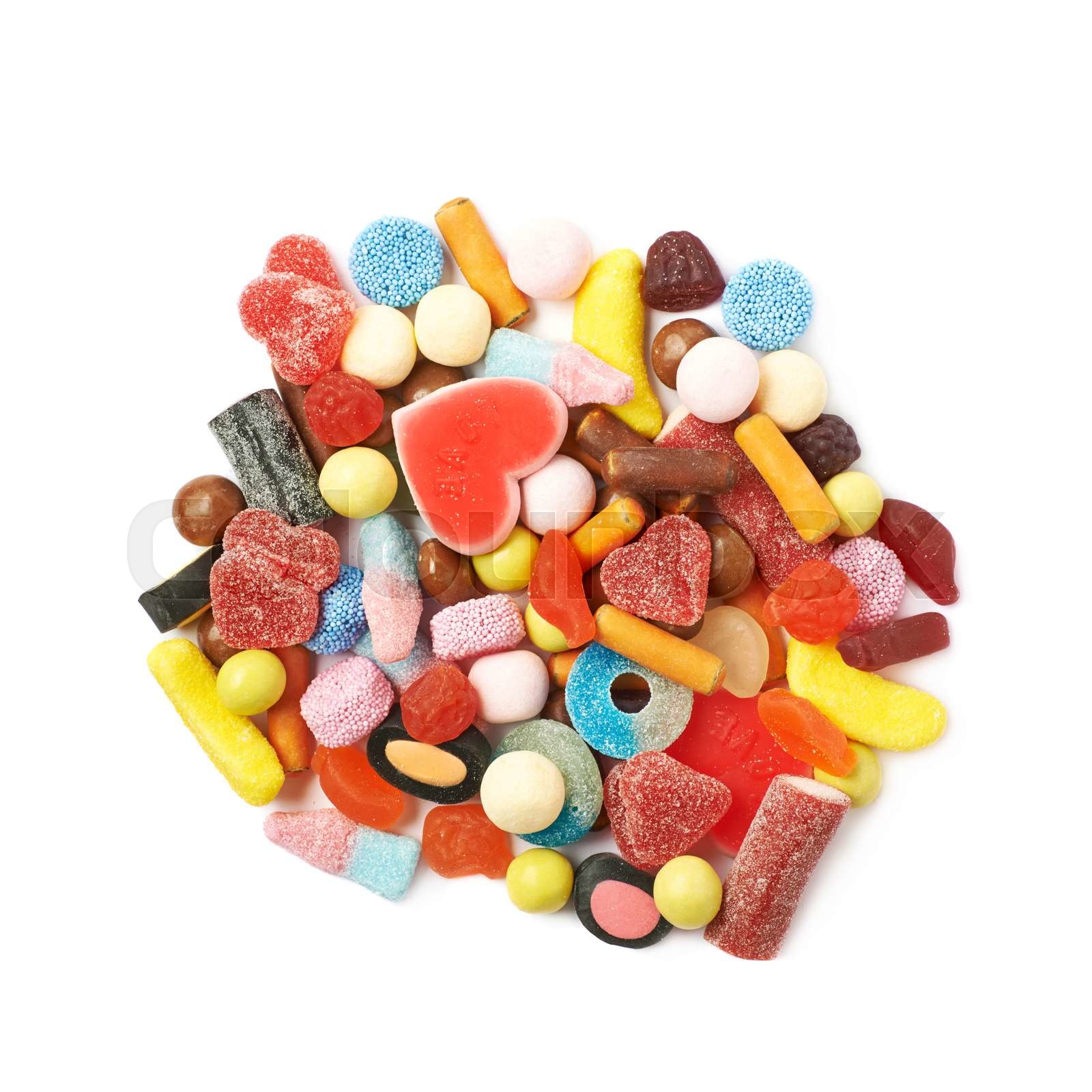 Pile of multiple different candies isolated | Stock image | Colourbox